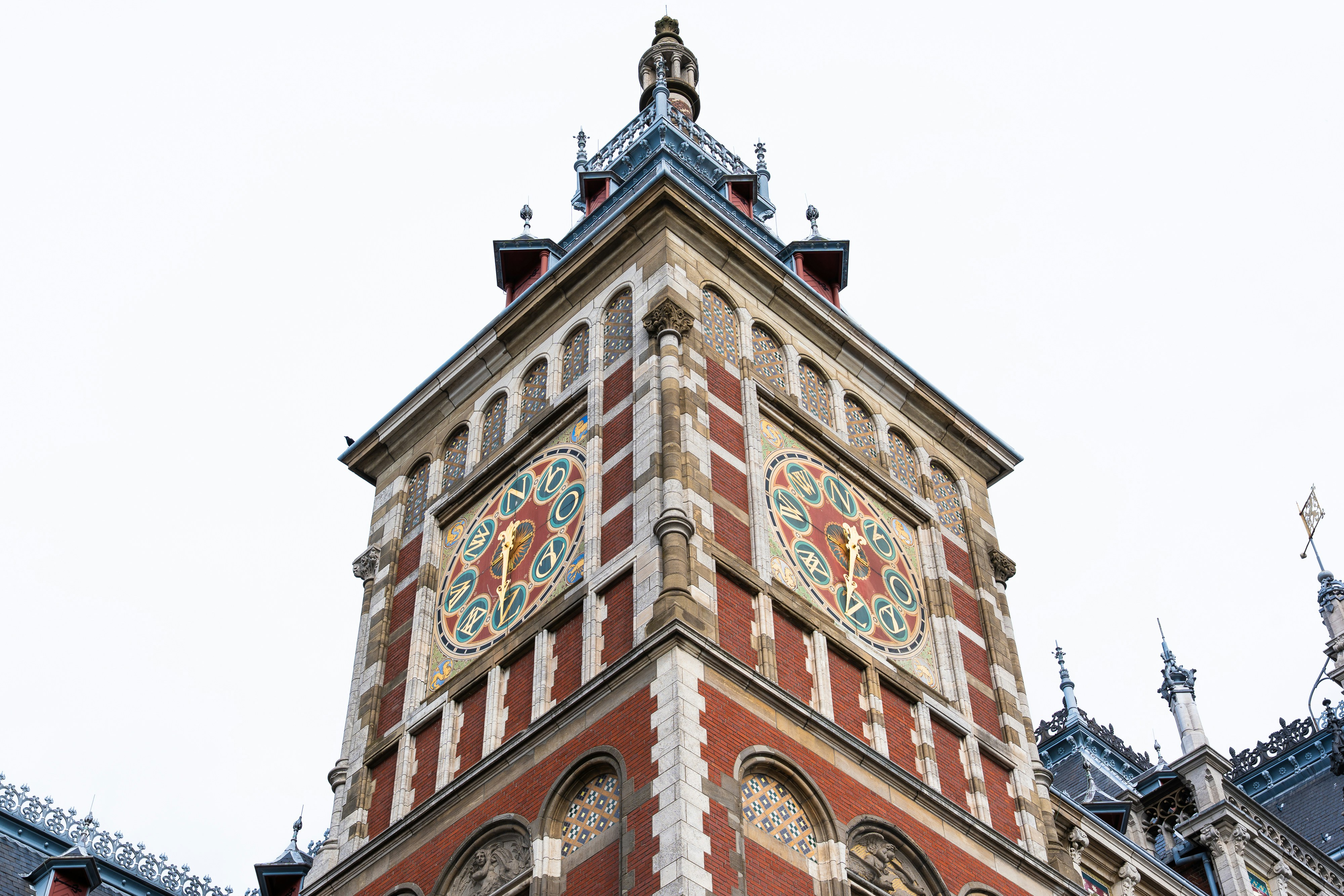 Ornate clock tower with intricate details against sky
