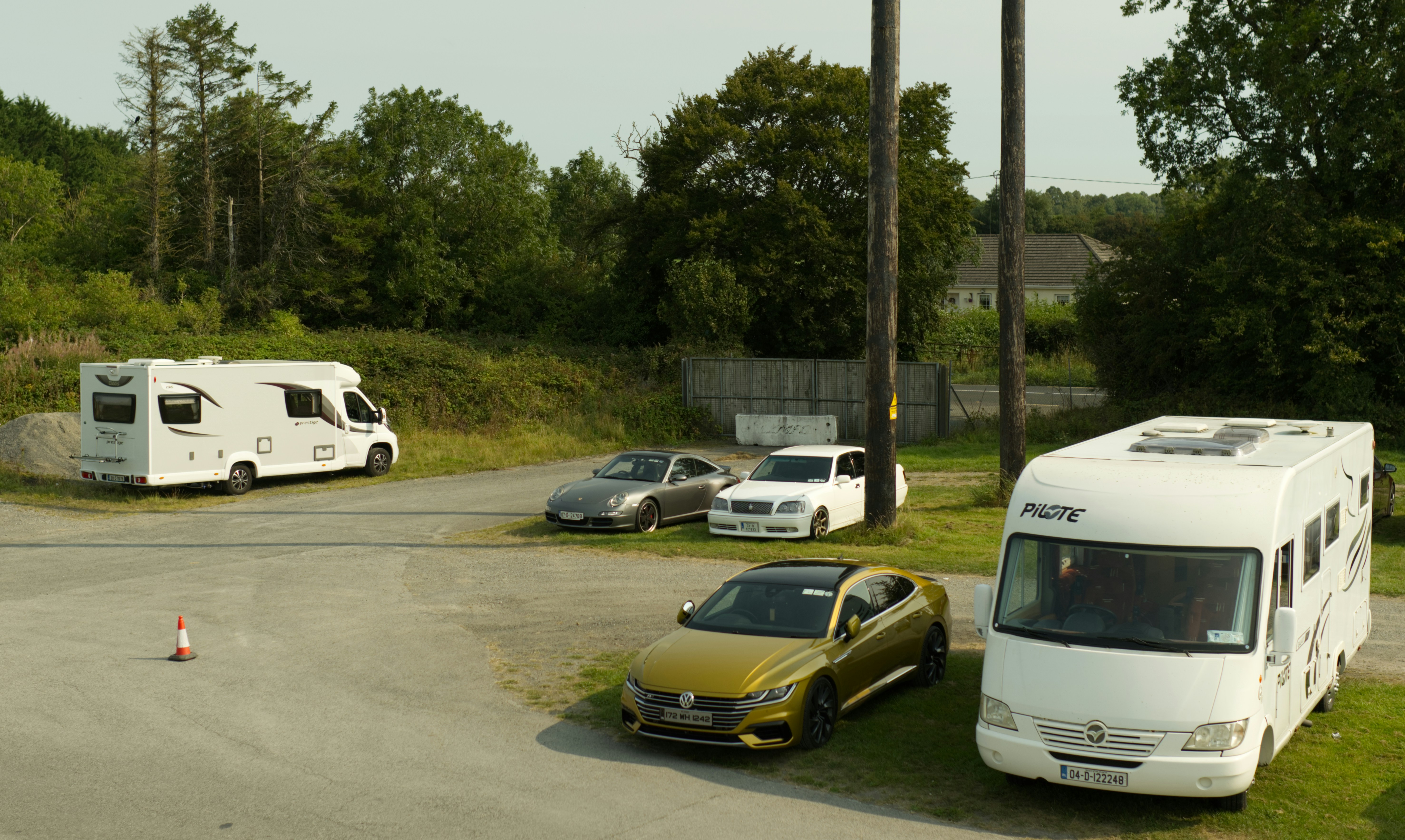 A Serene Gathering of Vehicles in Nature's Embrace