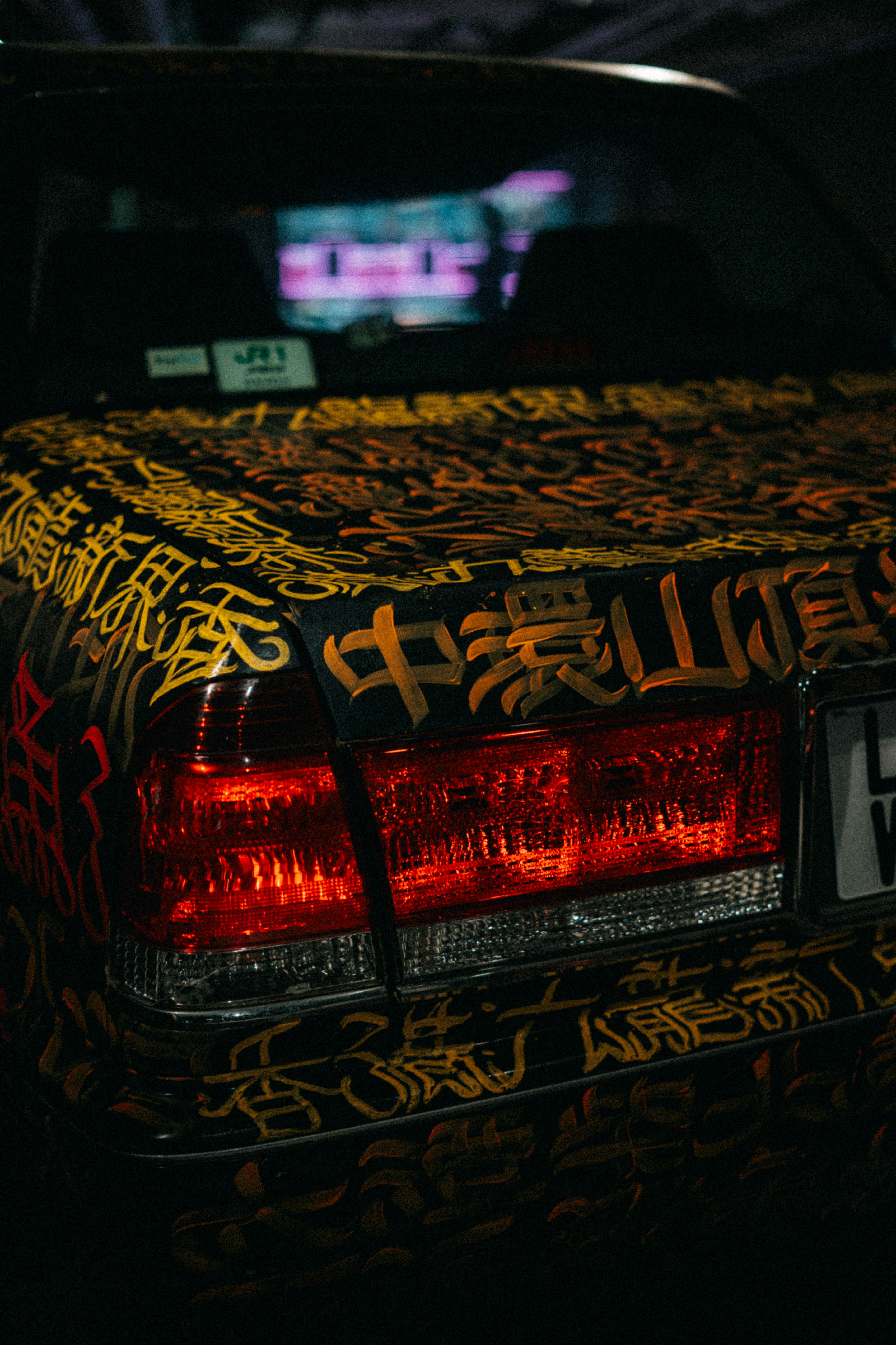 Hong Kong Street View - Sun Hung | Car with japanese calligraphy design at night