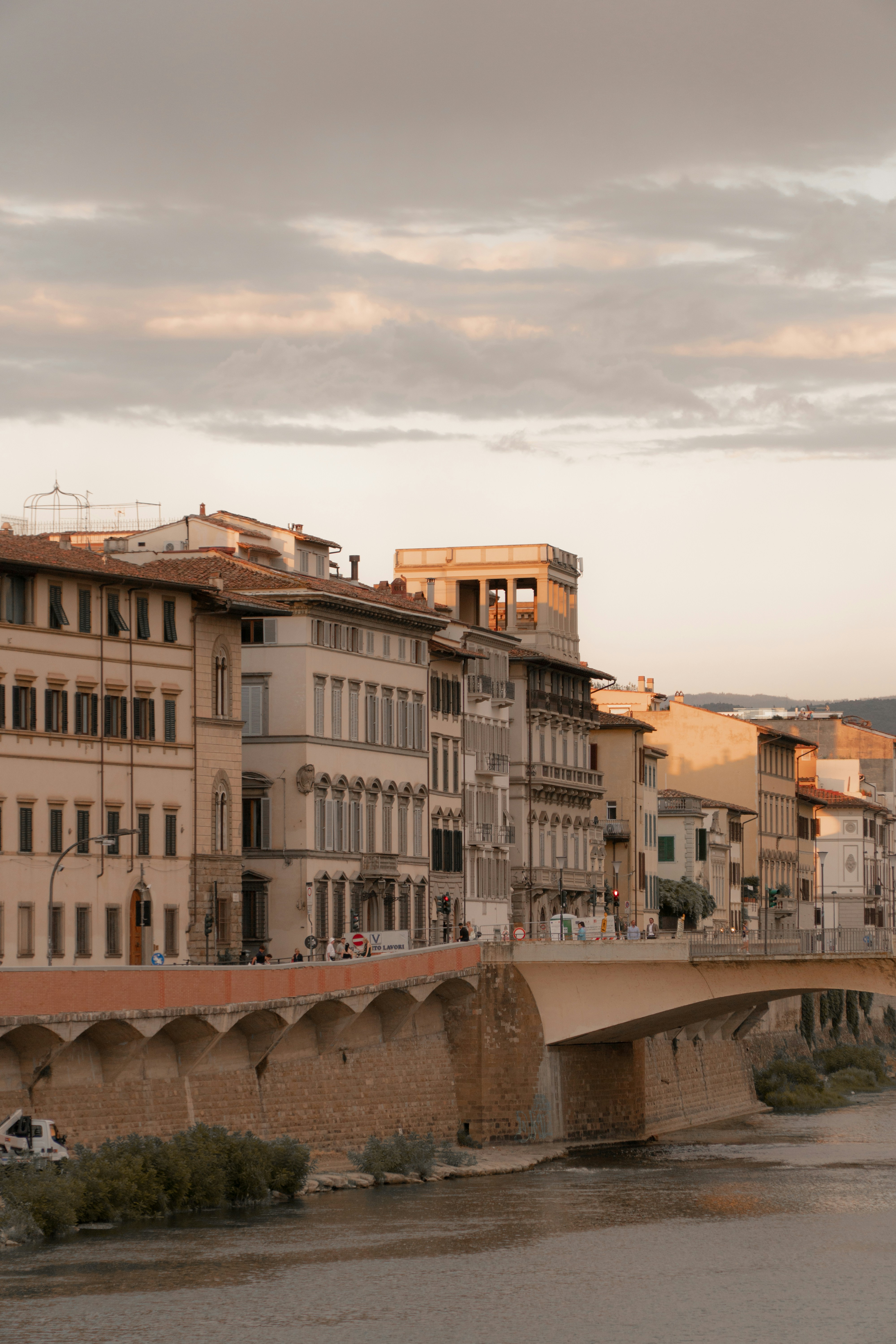 Sunlit Riverside Architecture Along a Tuscan-ish Riverscape