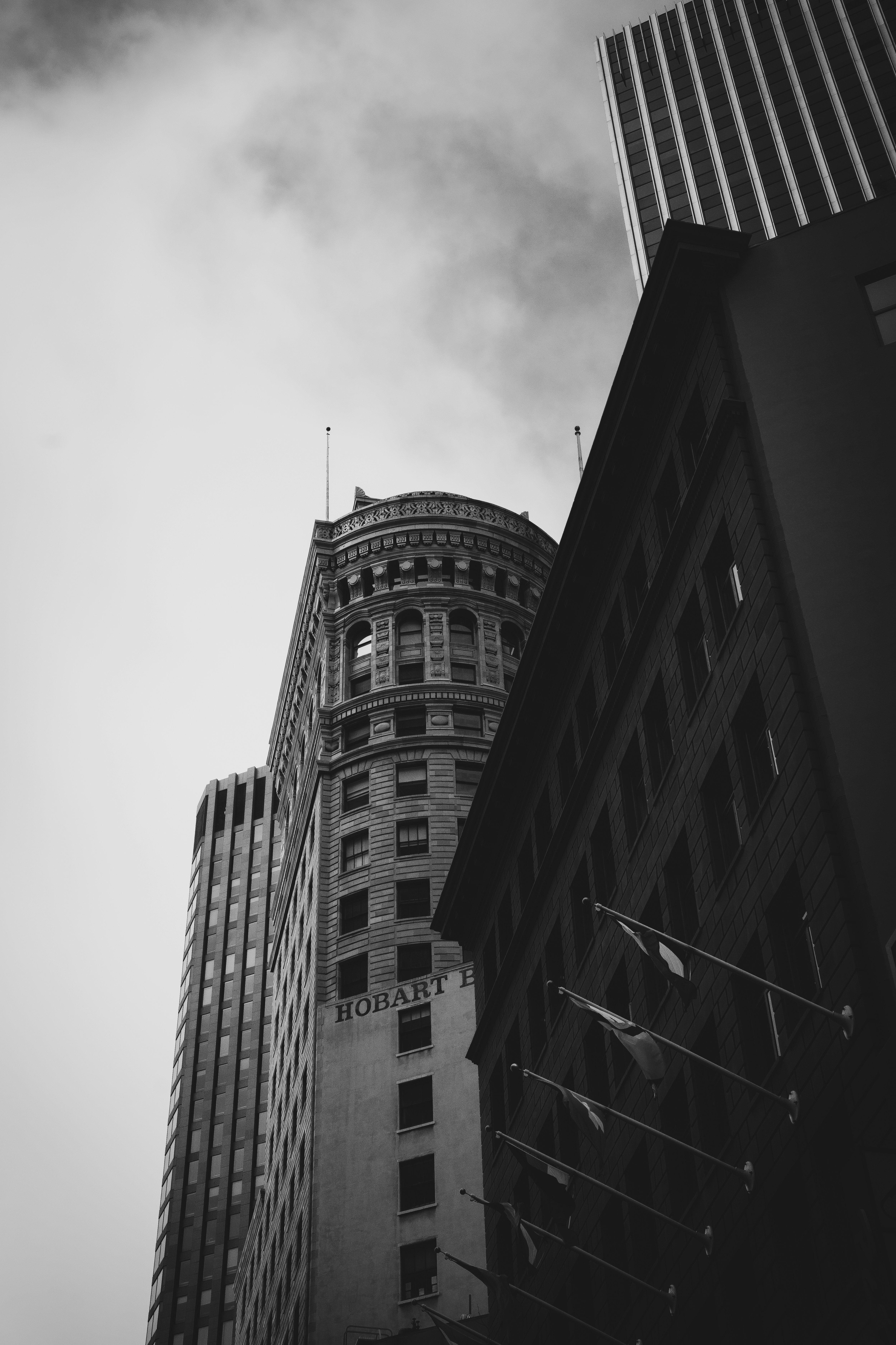 Tall buildings with architectural details against sky