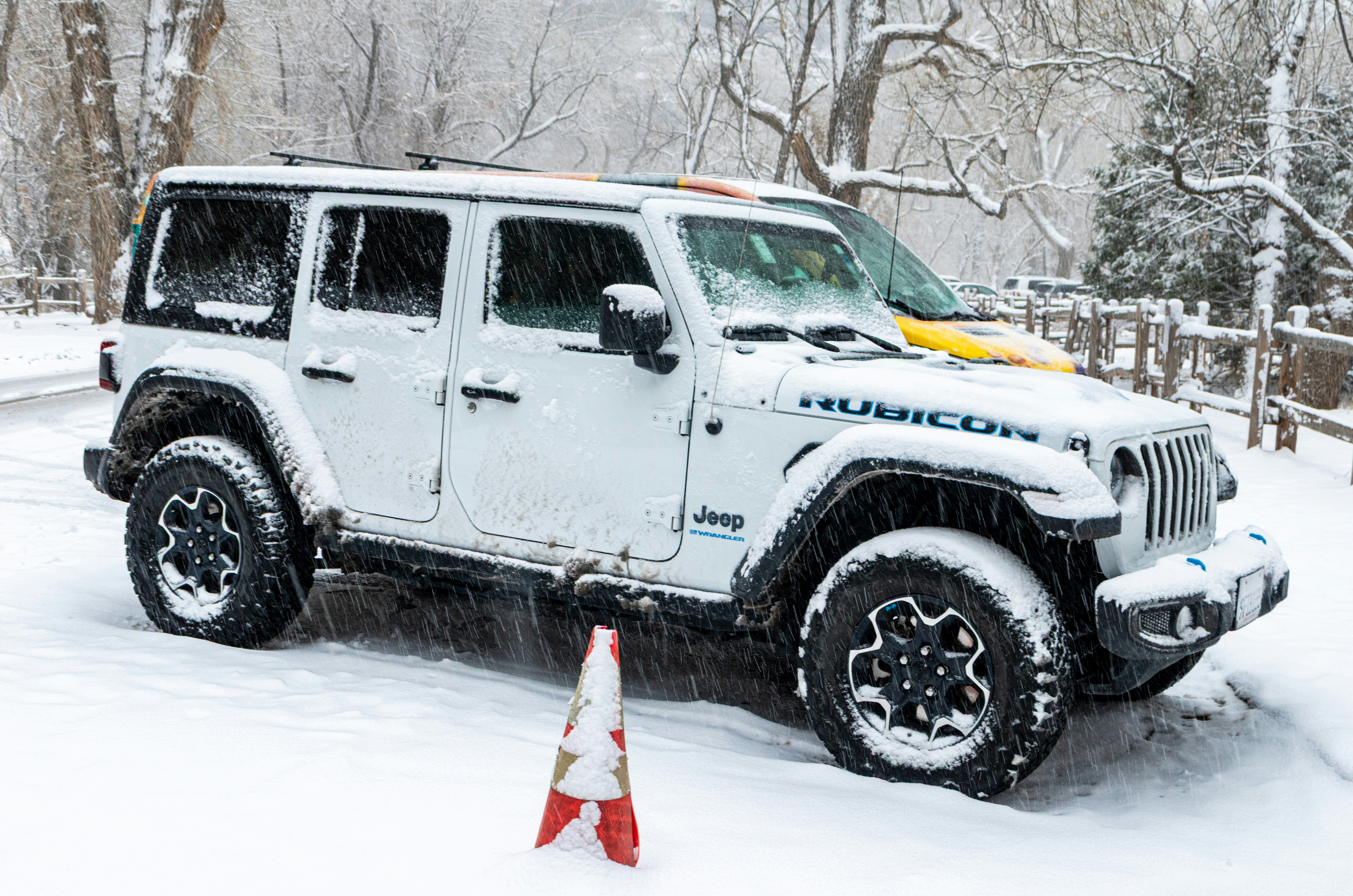 Winter's Resilient Ride: The Jeep Rubicon in a Snowy Embrace