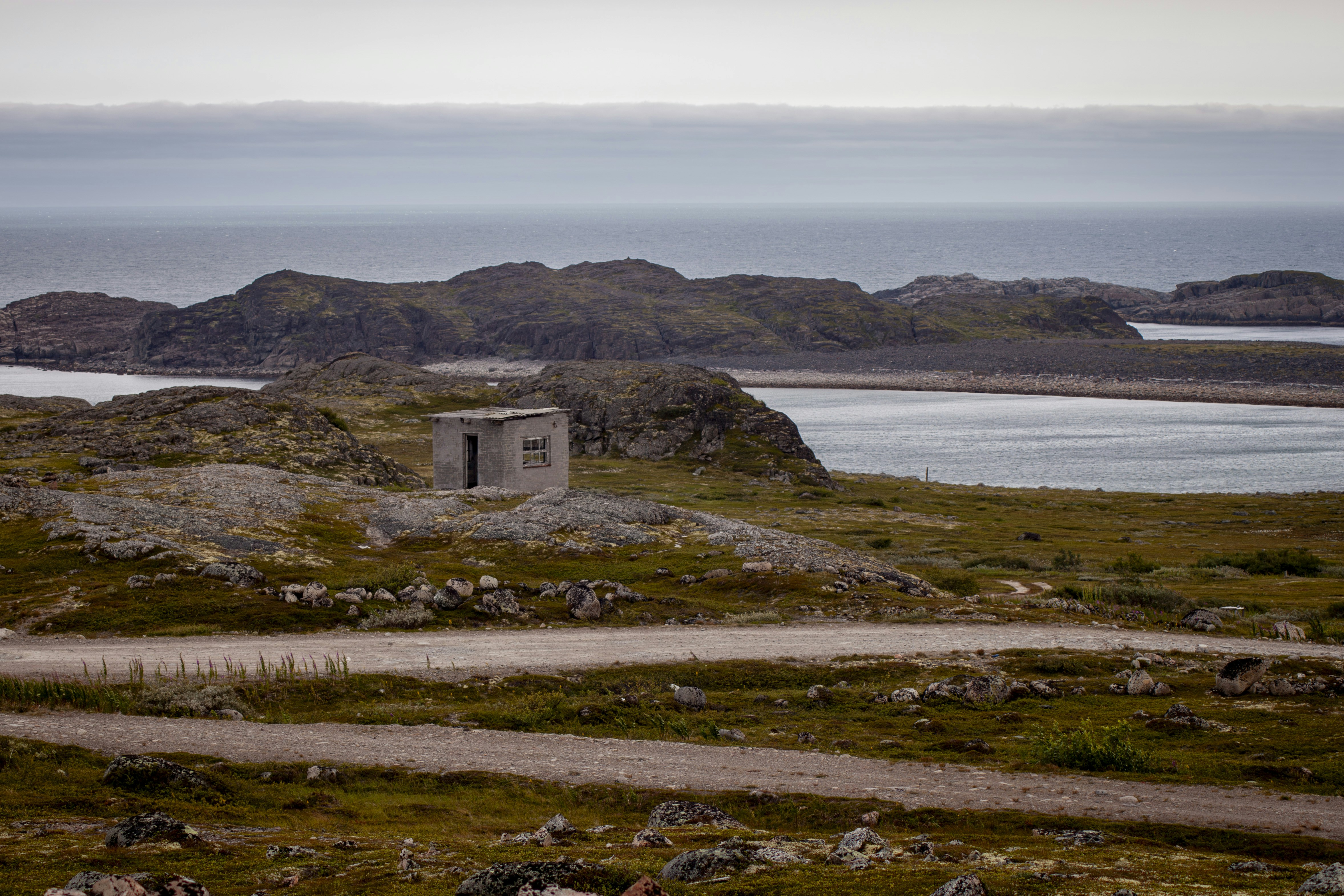 Solitary Structure Amidst Nature's Canvas