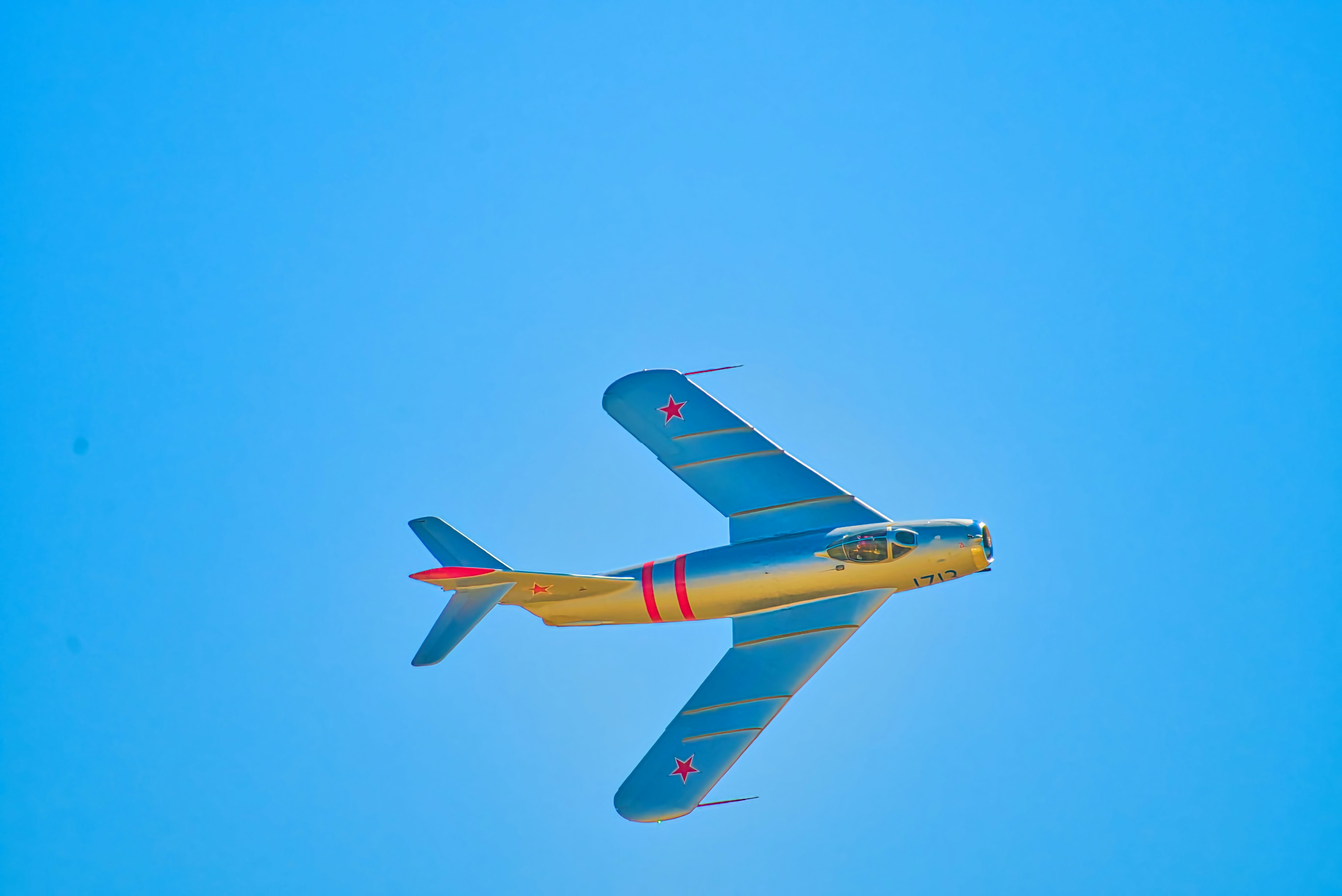 Aerial Elegance: The Vintage Stunt Performer