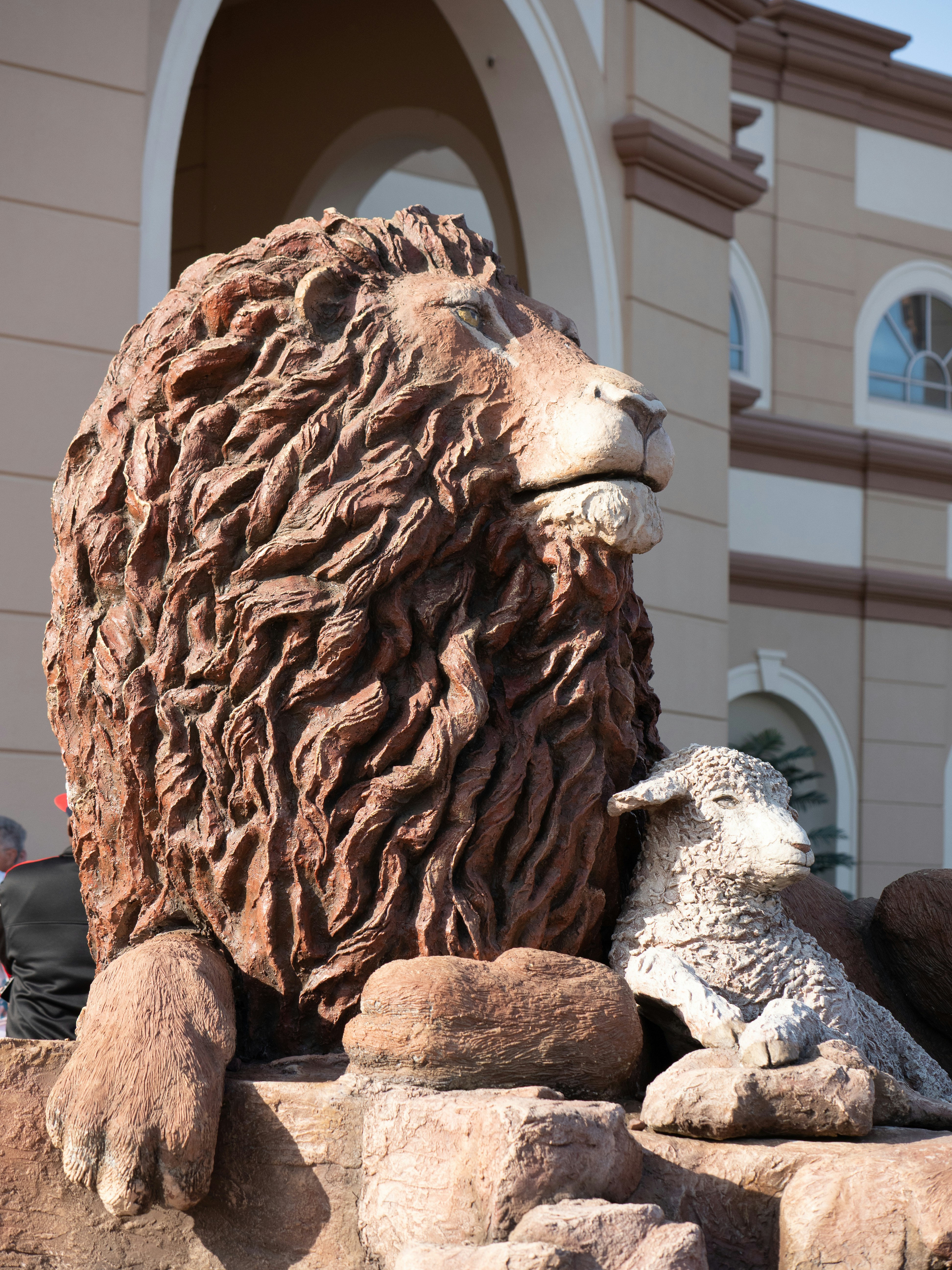 Regal Guardian: A Stone Lion and Its Small Companion