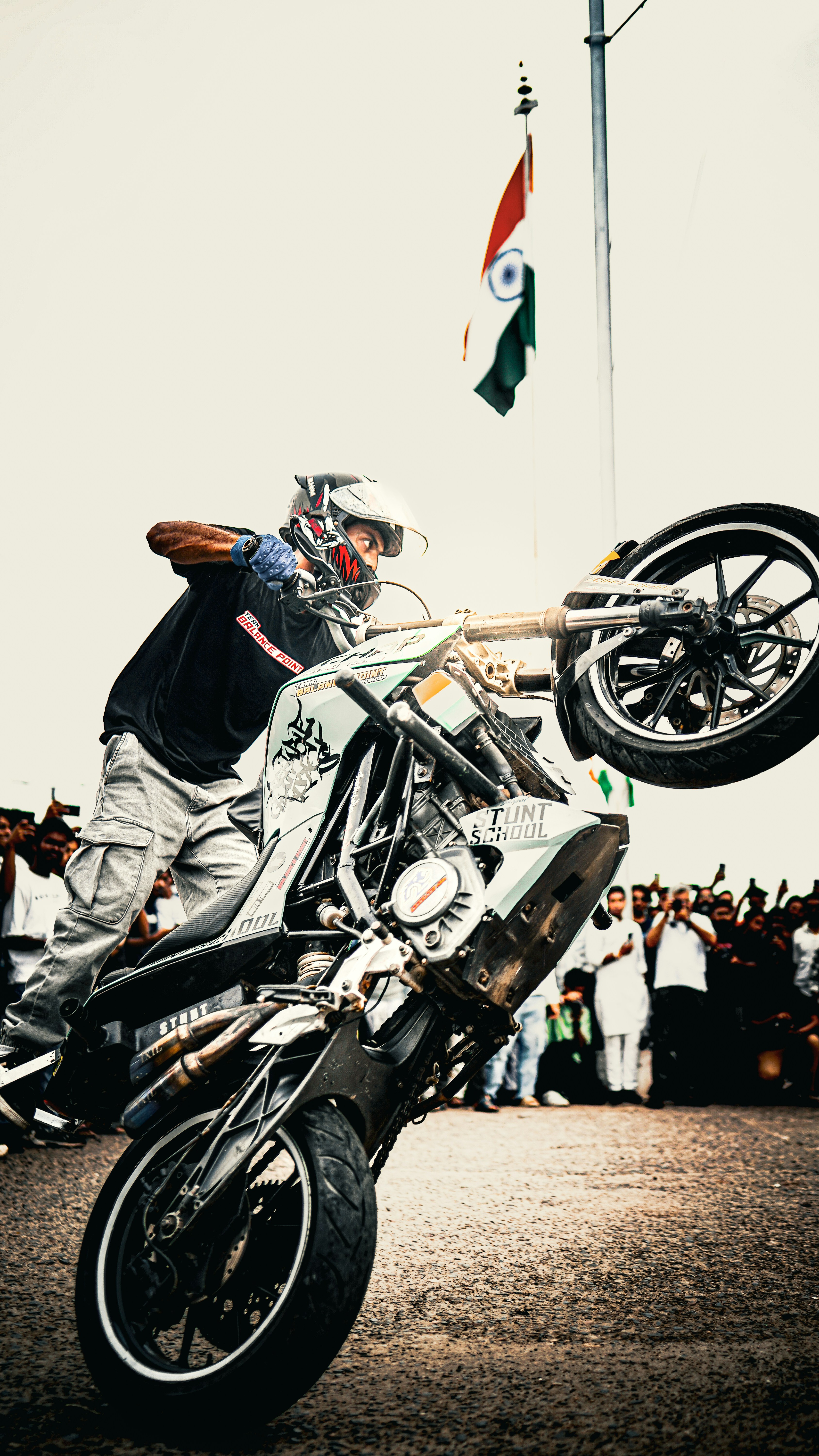 Gravity-Defying Motorcycle Maneuver at the Festival