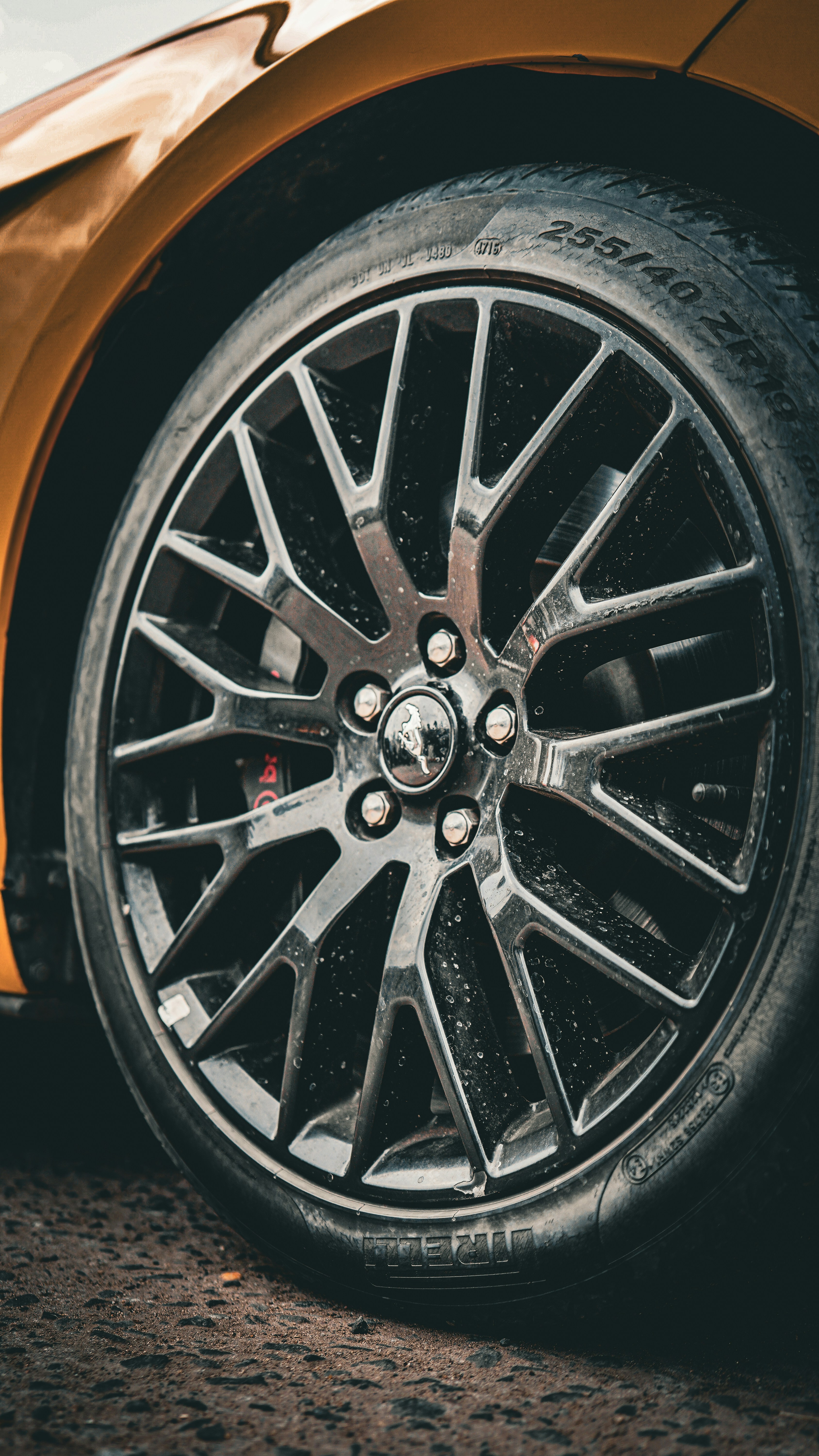 Close-up of a car wheel with a black rim.
