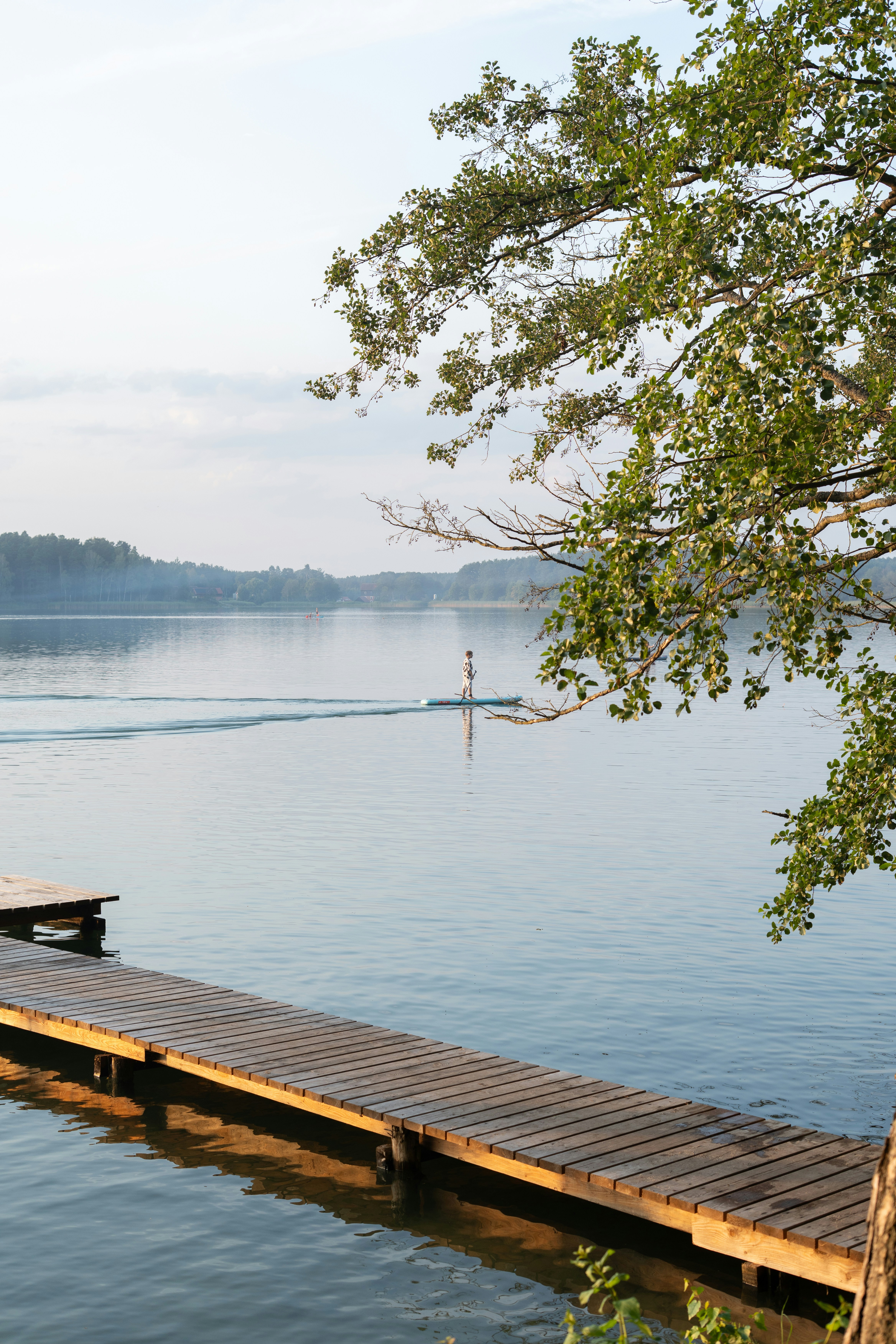 Serenity on the Water: A Paddleboarder's Escape