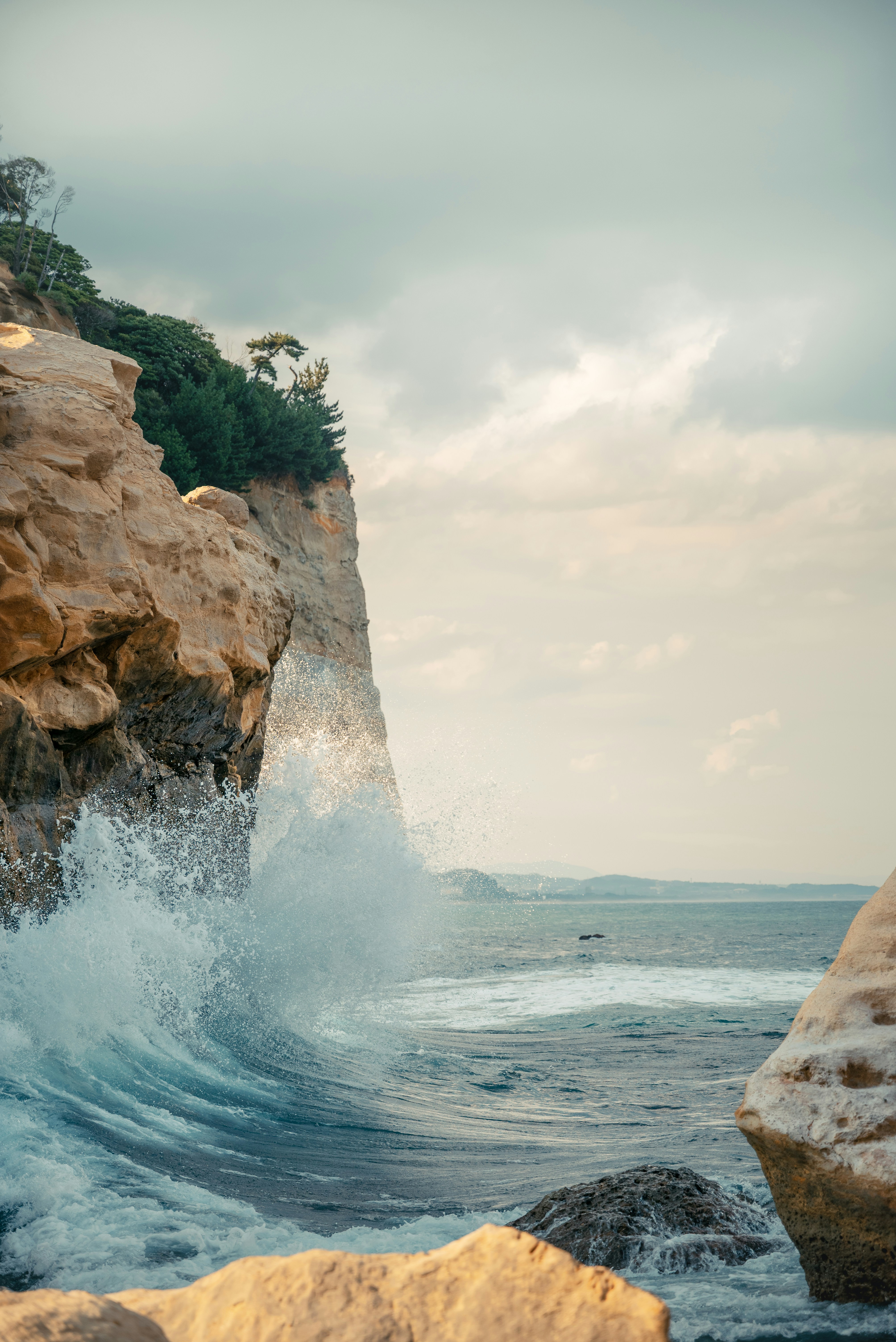 Erosion's Dance: Waves and Stone