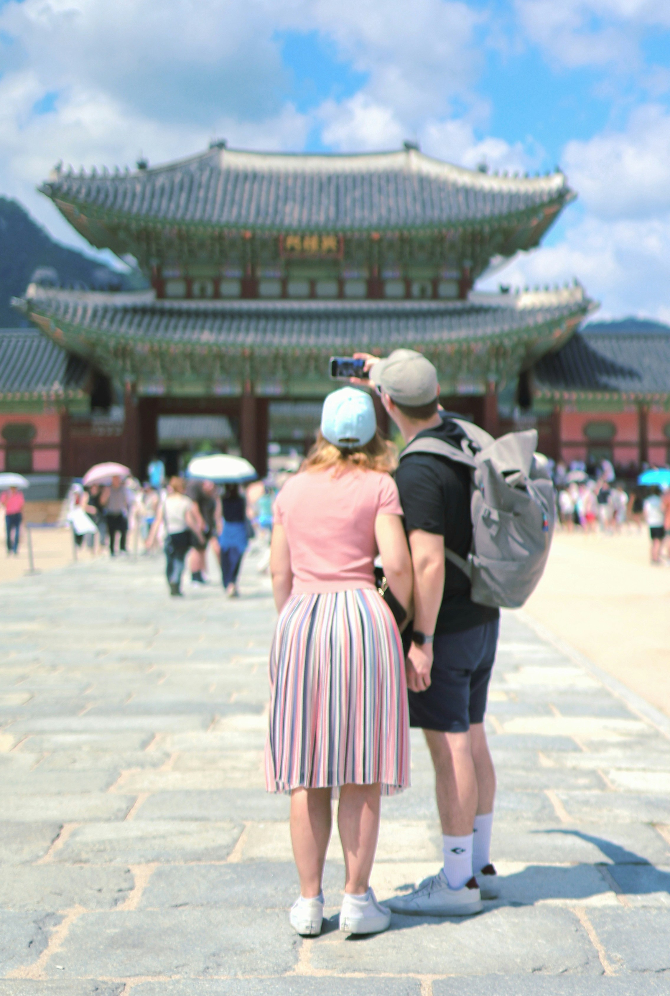 A Cherished Moment at the Historic Gates