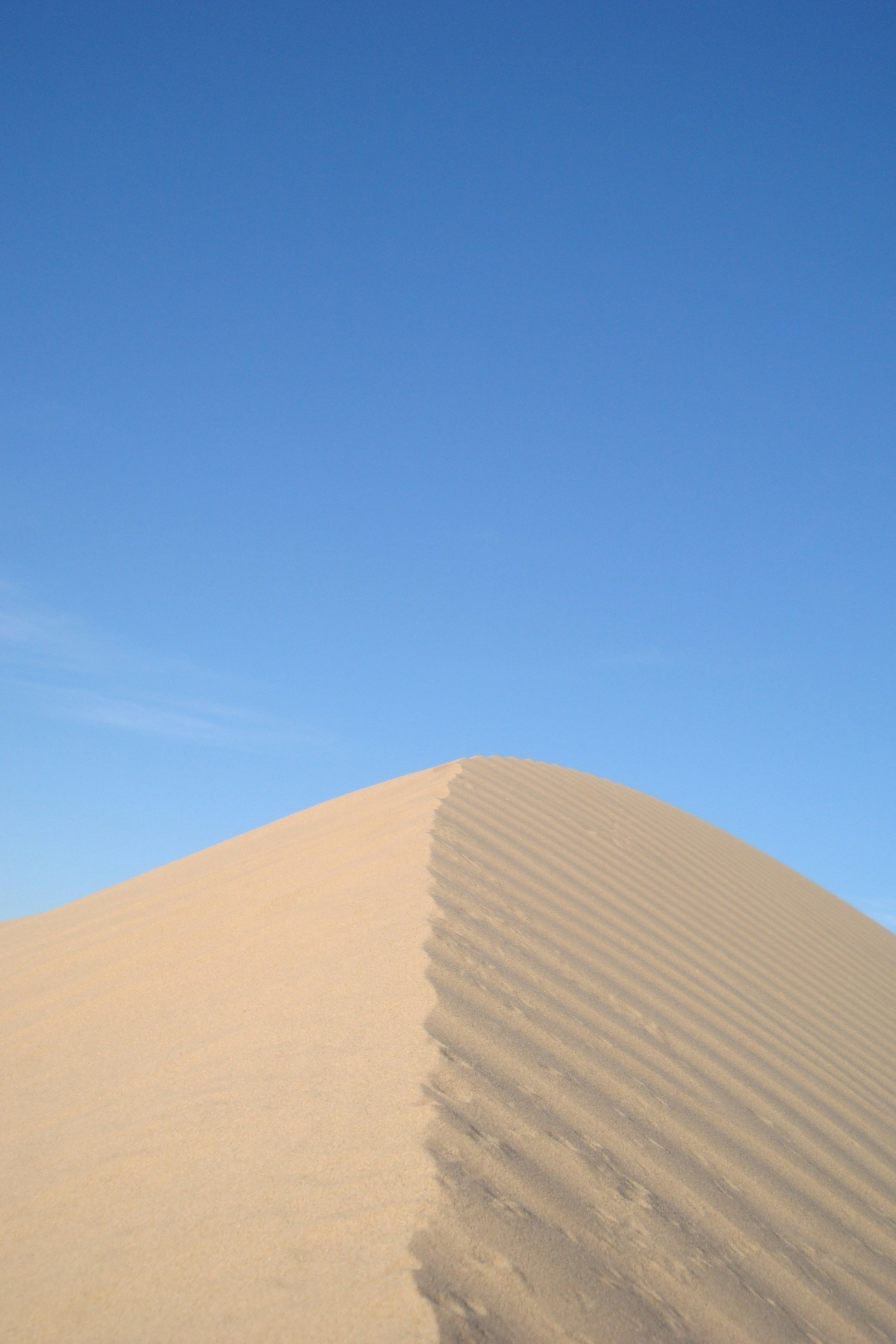 Dune | Sand dune under a clear blue sky