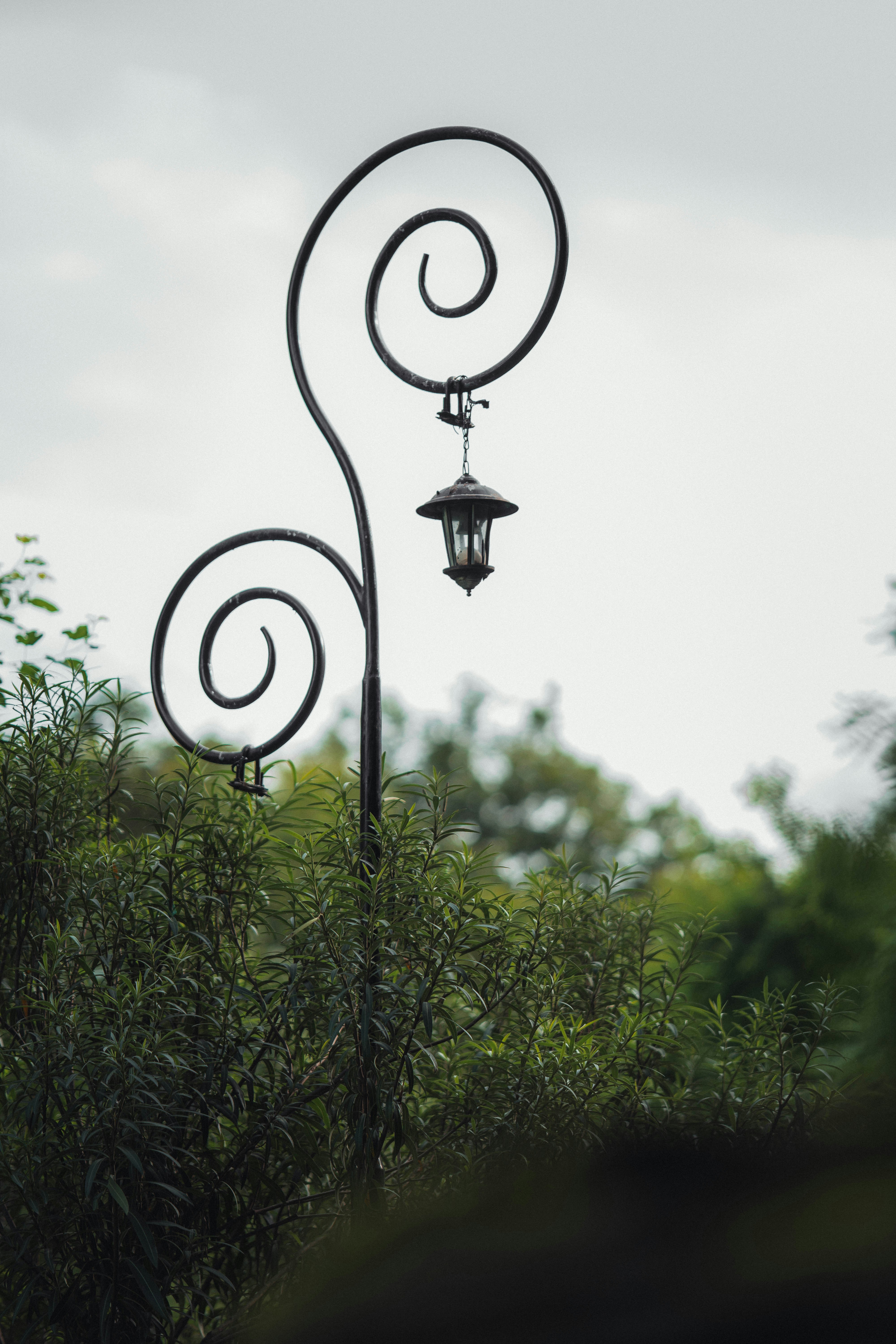 Whimsical Lantern on a Spiraled Post