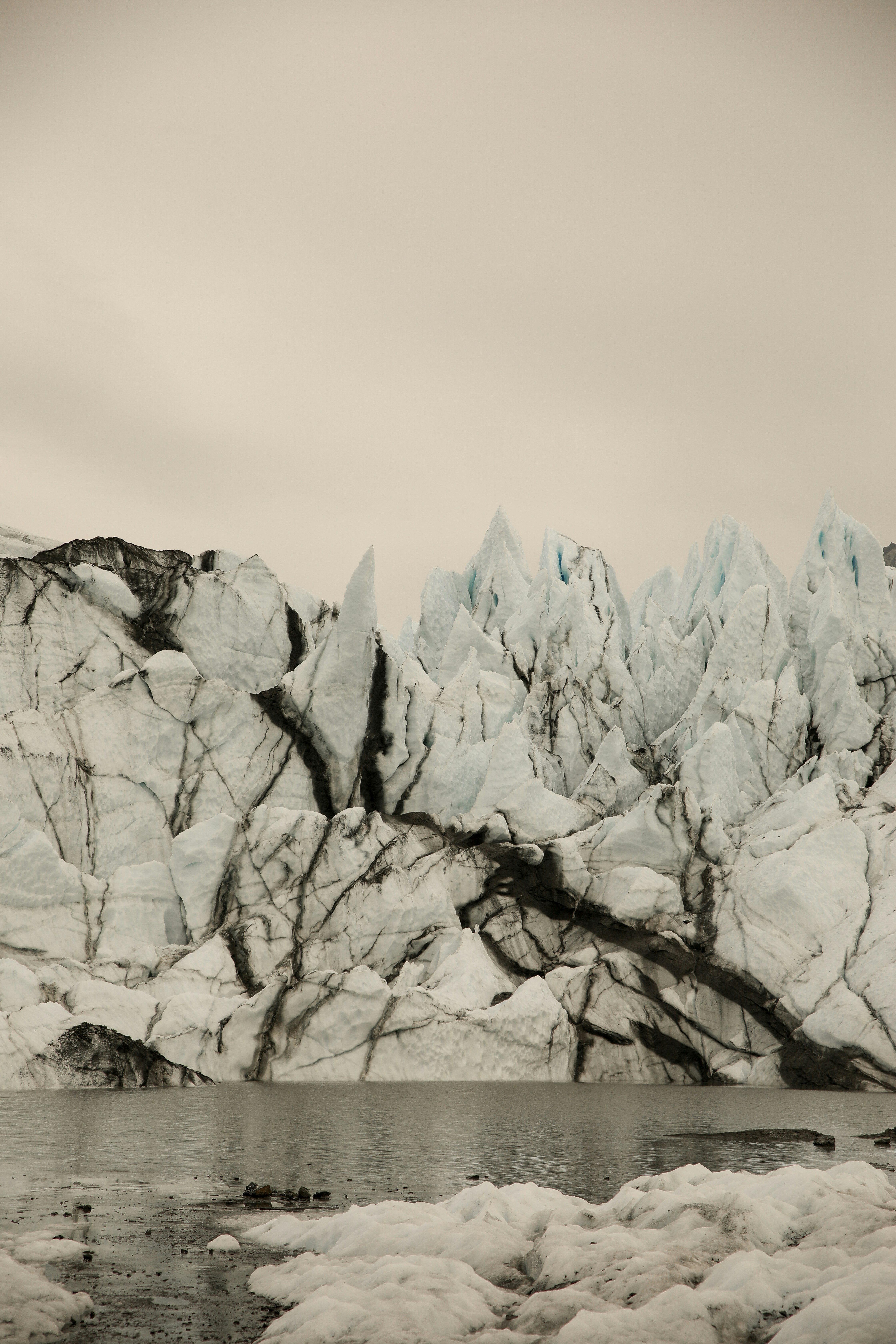 Crevasse Cathedral: Ice Towers Rising Over a Quiet Fjord