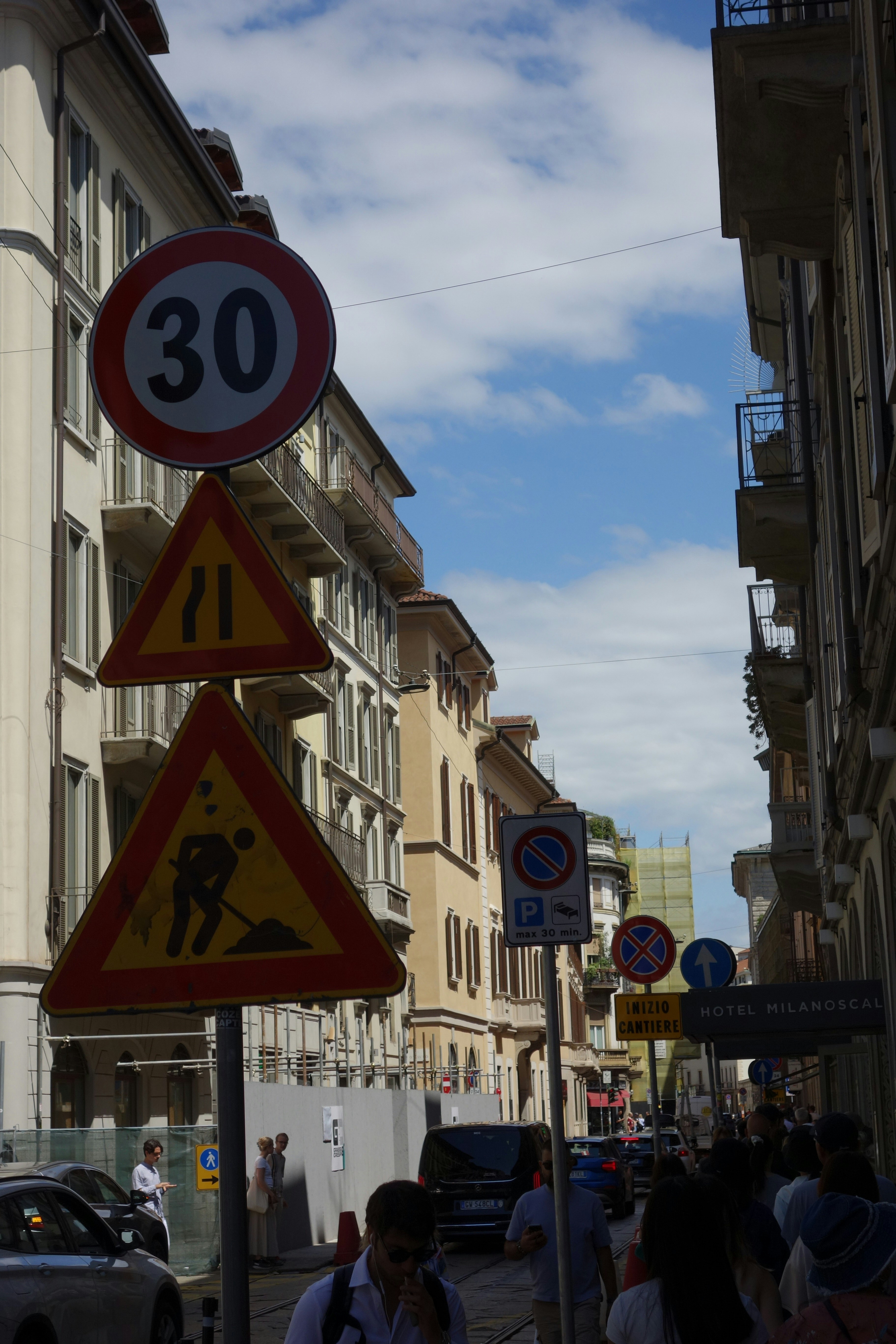Street signs and buildings on a sunny day