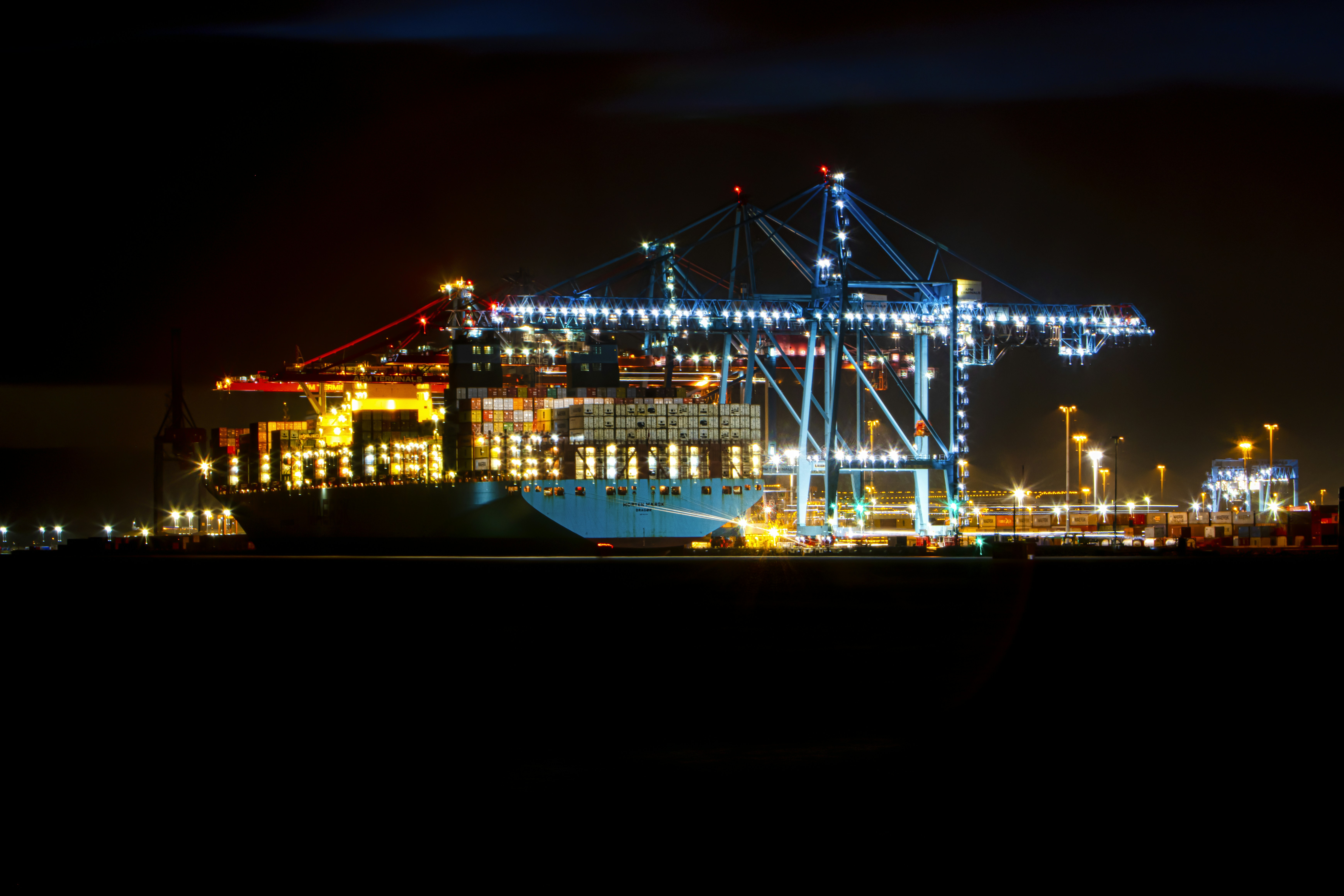 Nautical Symphony: The Nighttime Dance of Cargo Giants