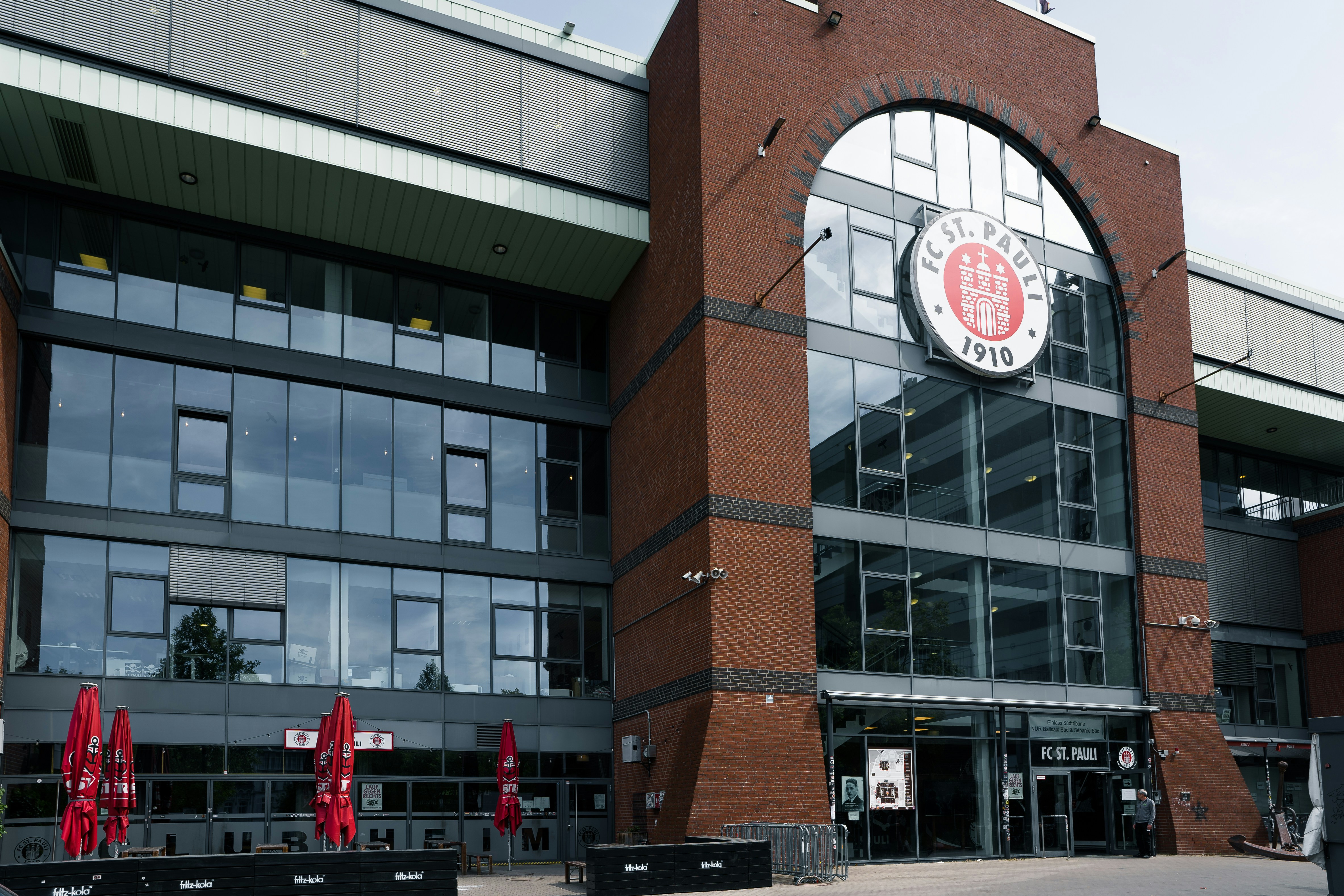Modern stadium entrance with large arched windows photo – Free City ...
