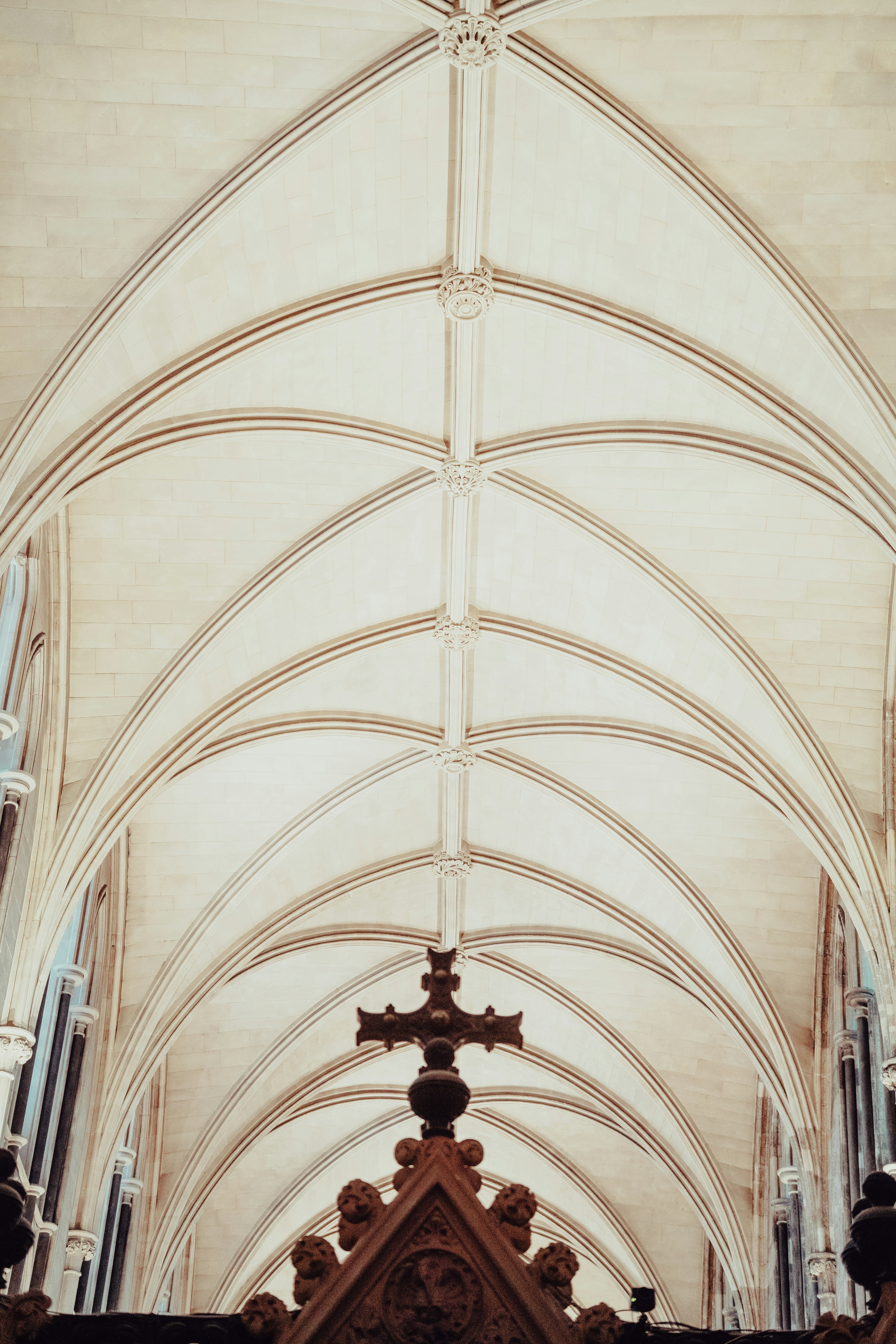 Gothic cathedral ceiling with ornate cross