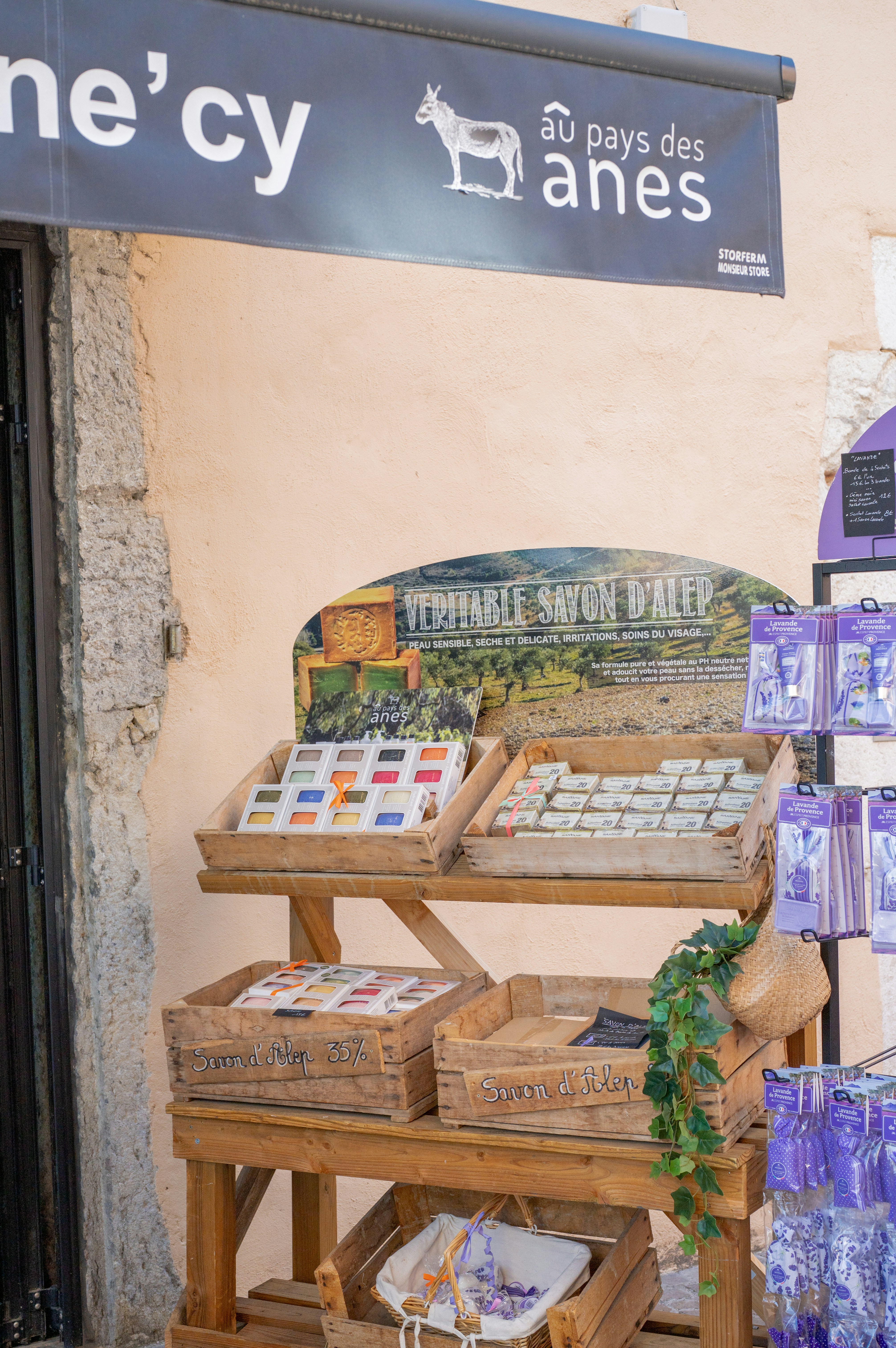 Vibrant Display of Herbal Goods in a Rustic Market Stand