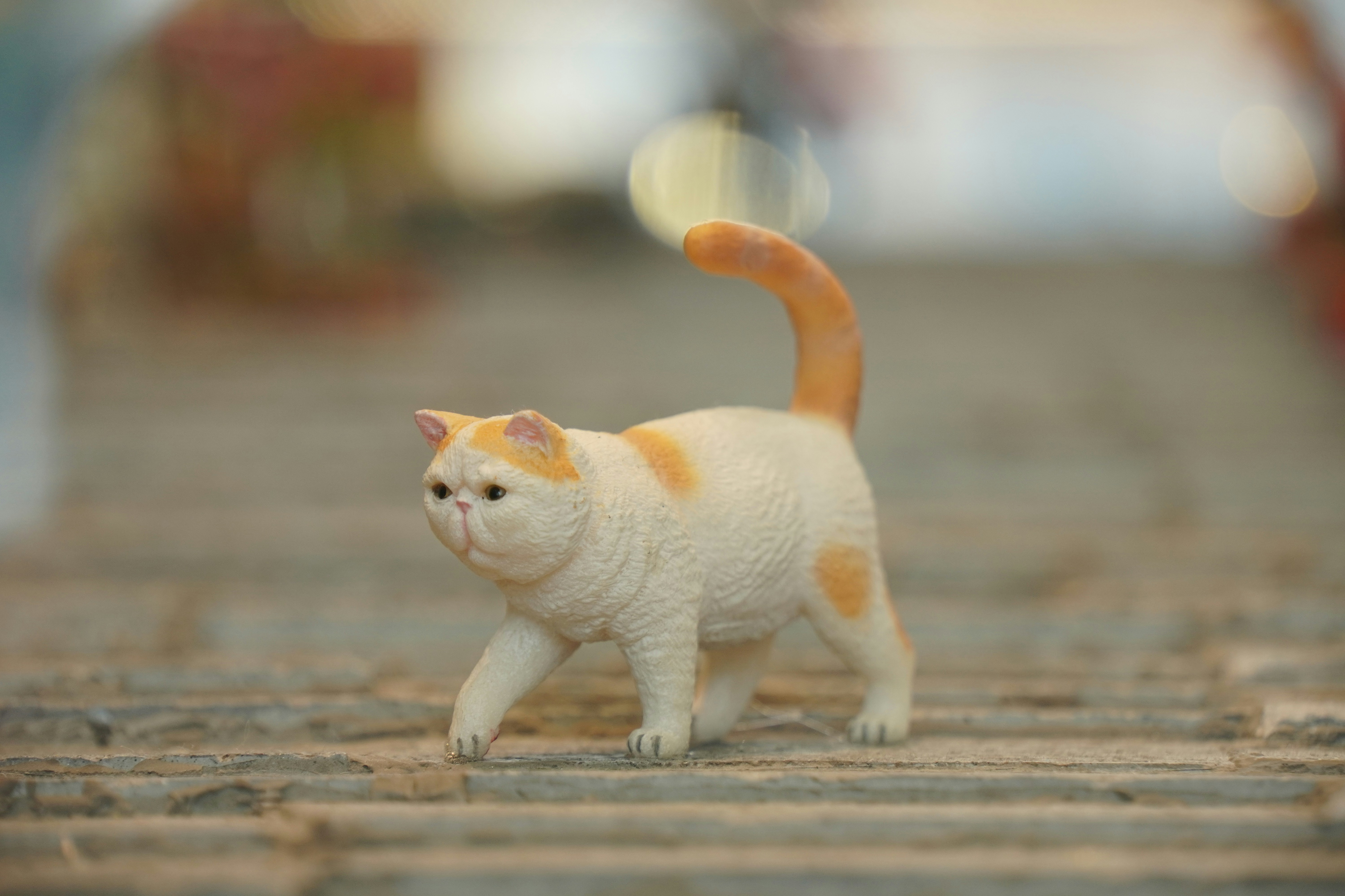 Whimsical Walk: The Playful Cat Figurine