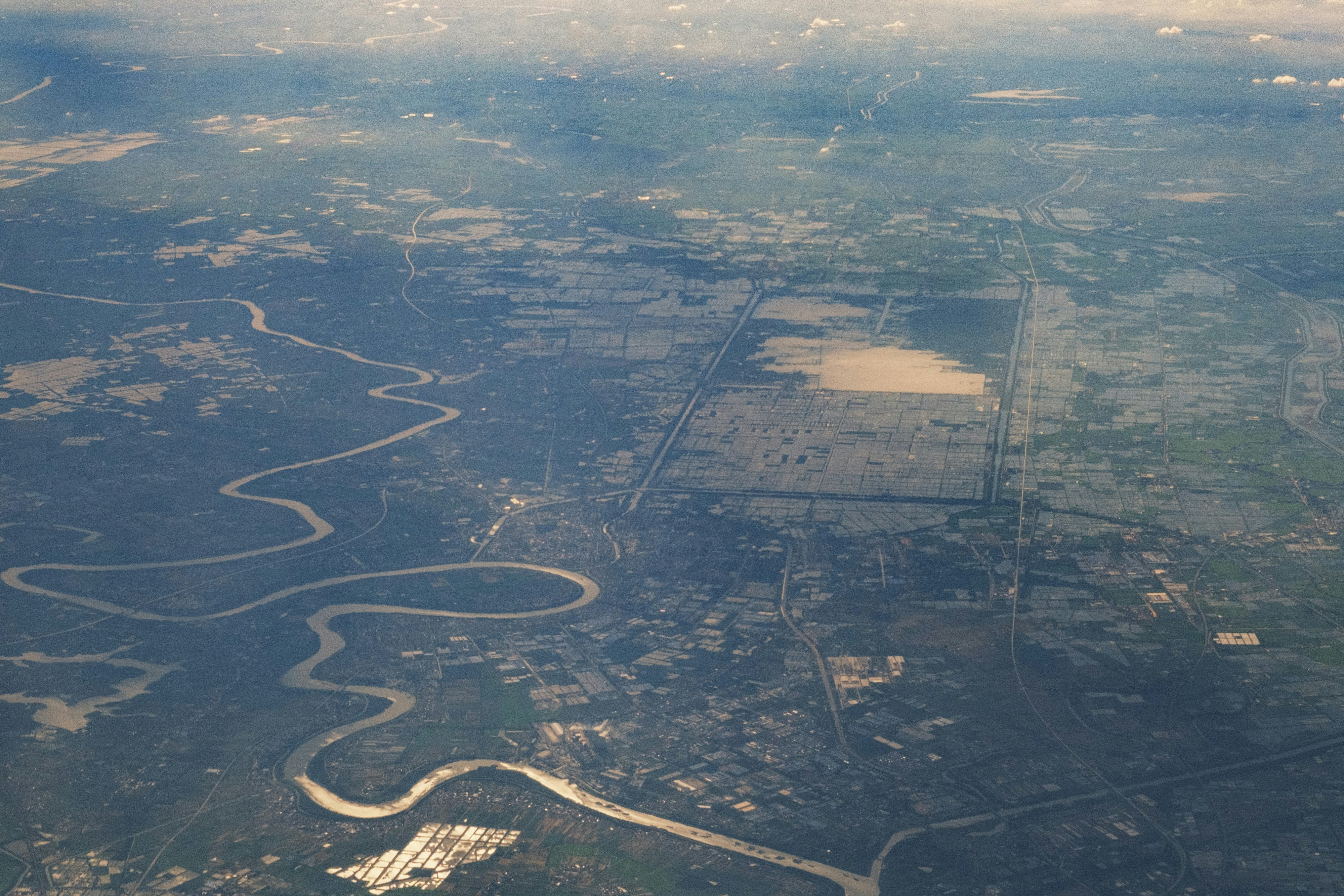 Aerial Tapestry: The Dance of Land and Water