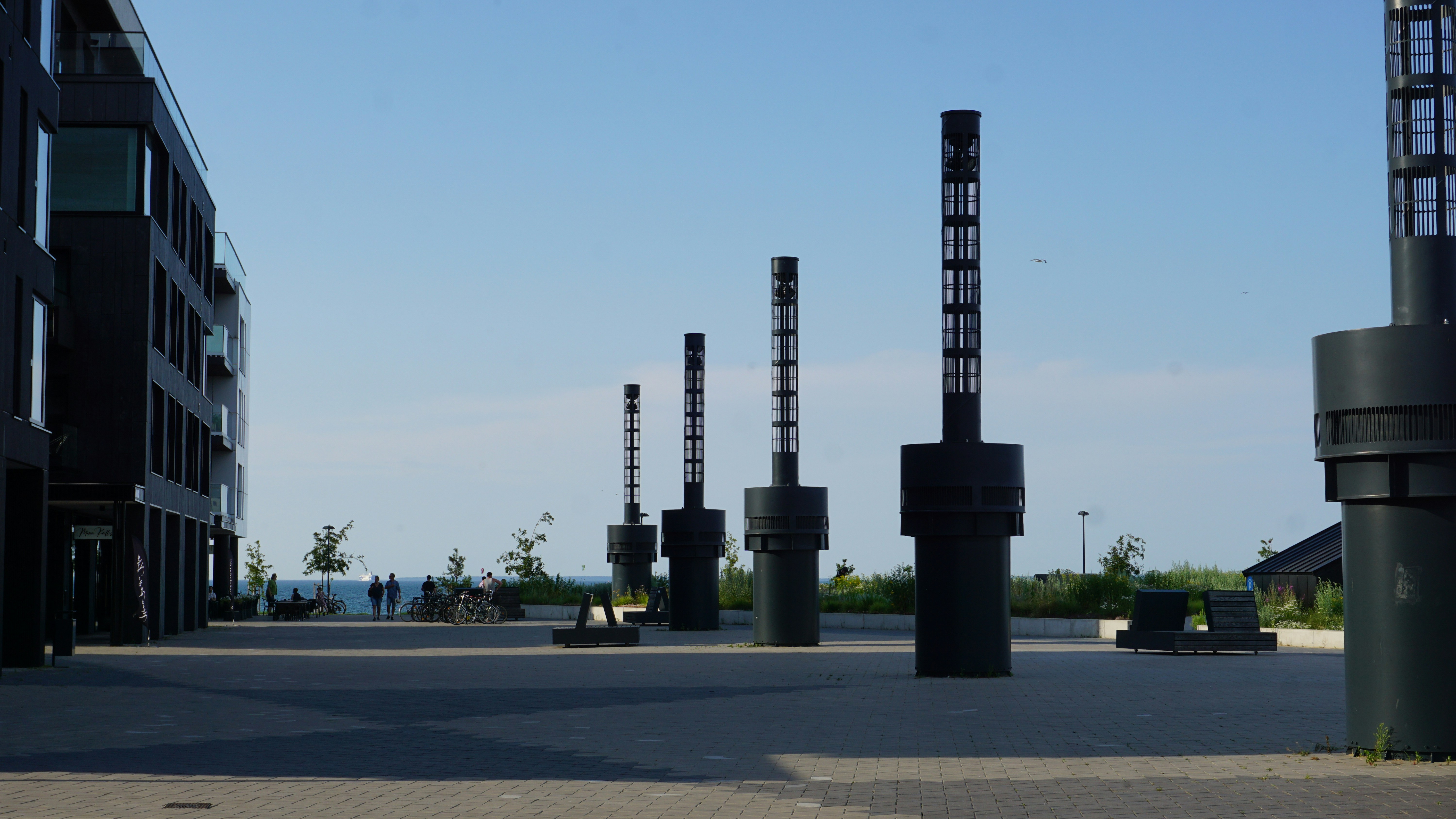 Modern buildings and abstract sculptures on a sunny day