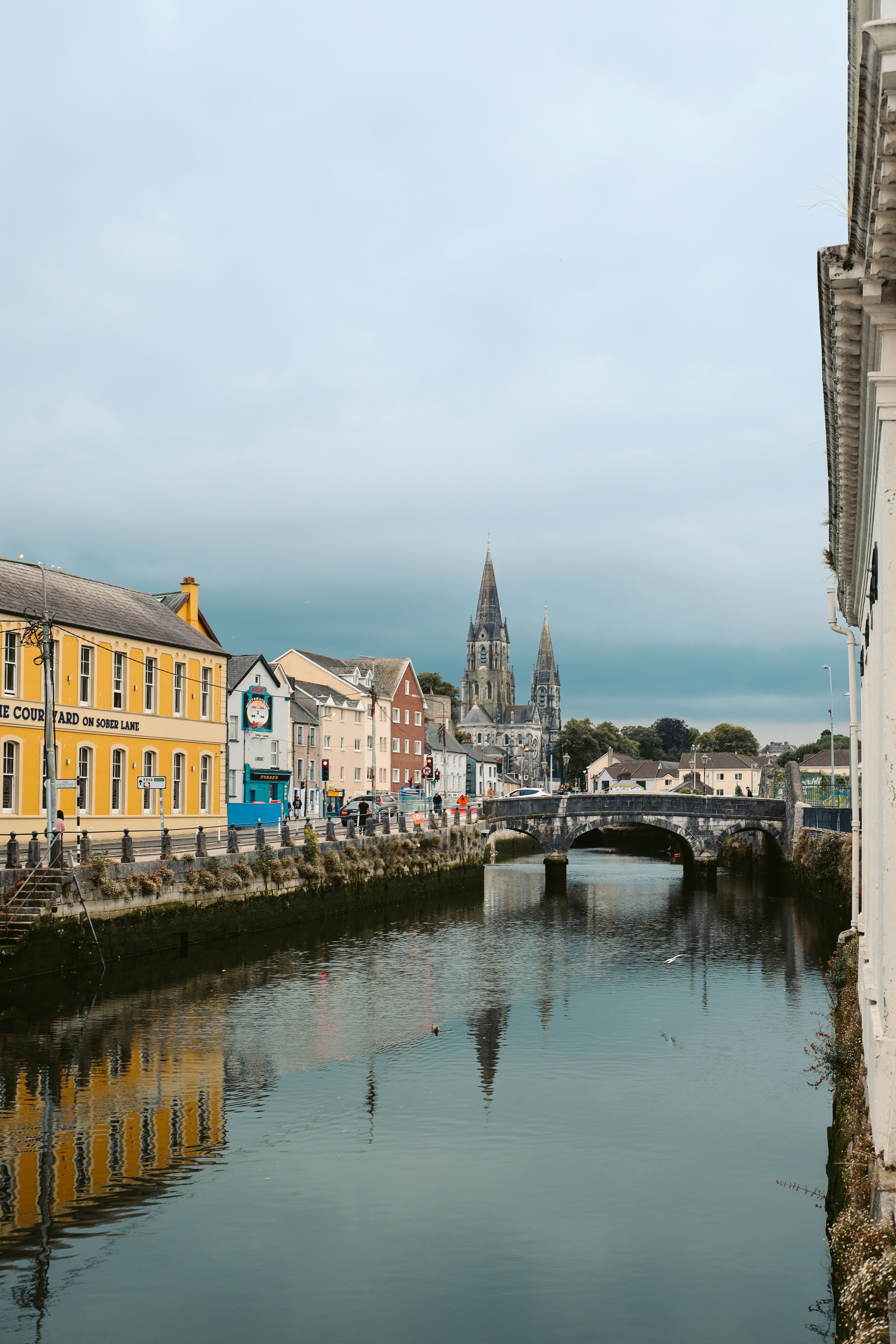 City canal with historic buildings and bridge
