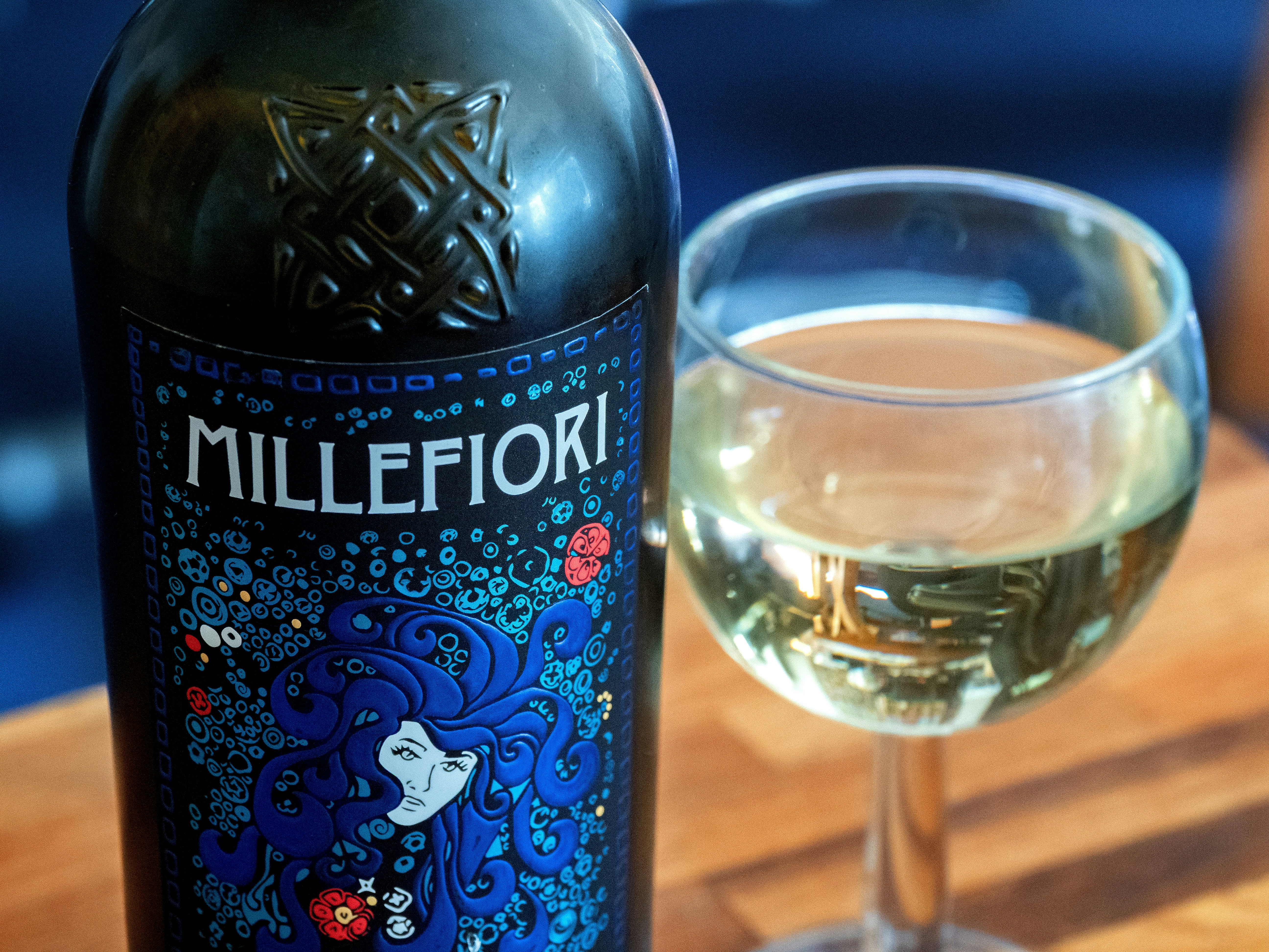 Blue Spirals and Golden Glass: a Portrait of Quiet Elixirs