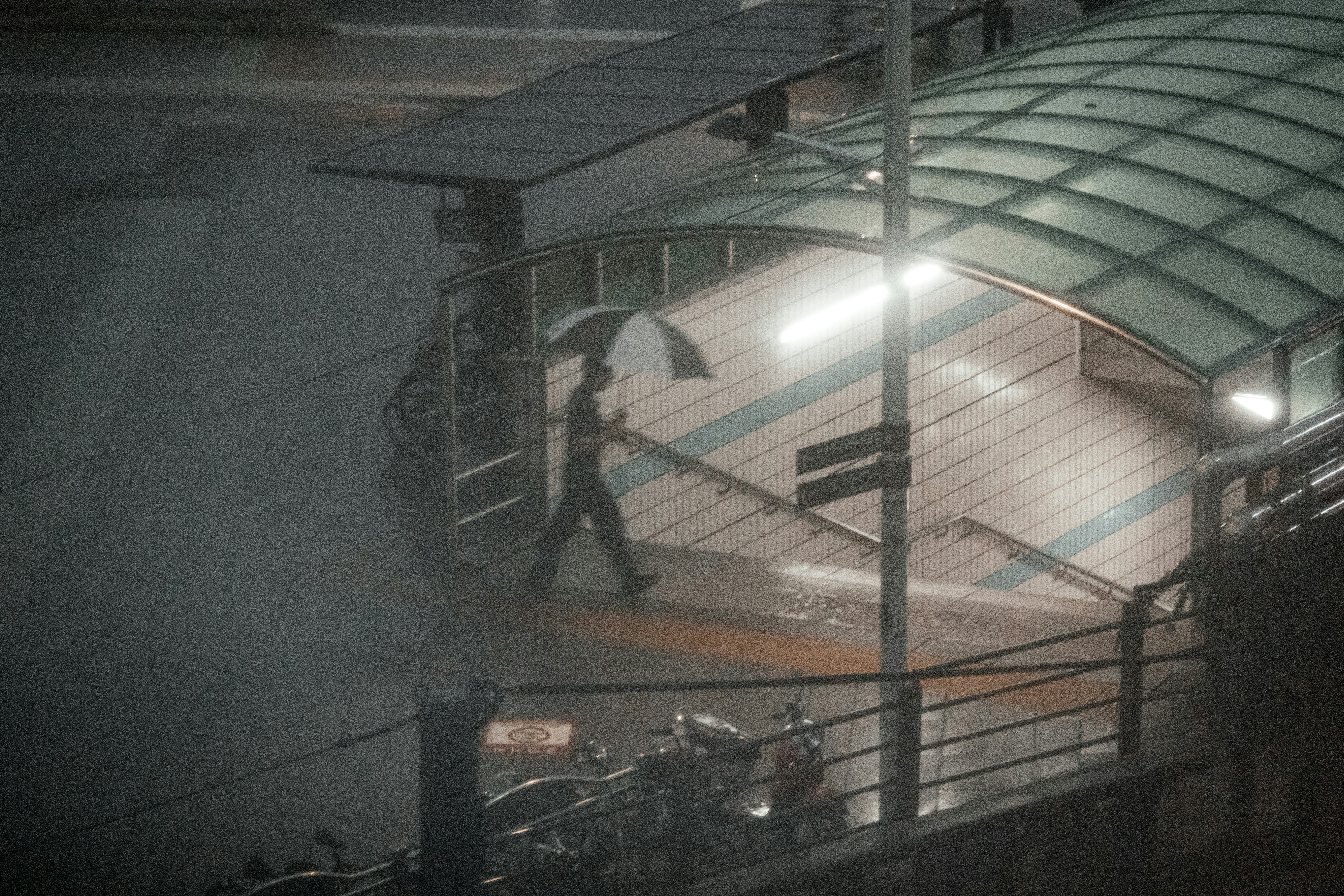 Urban Solitude in the Rain