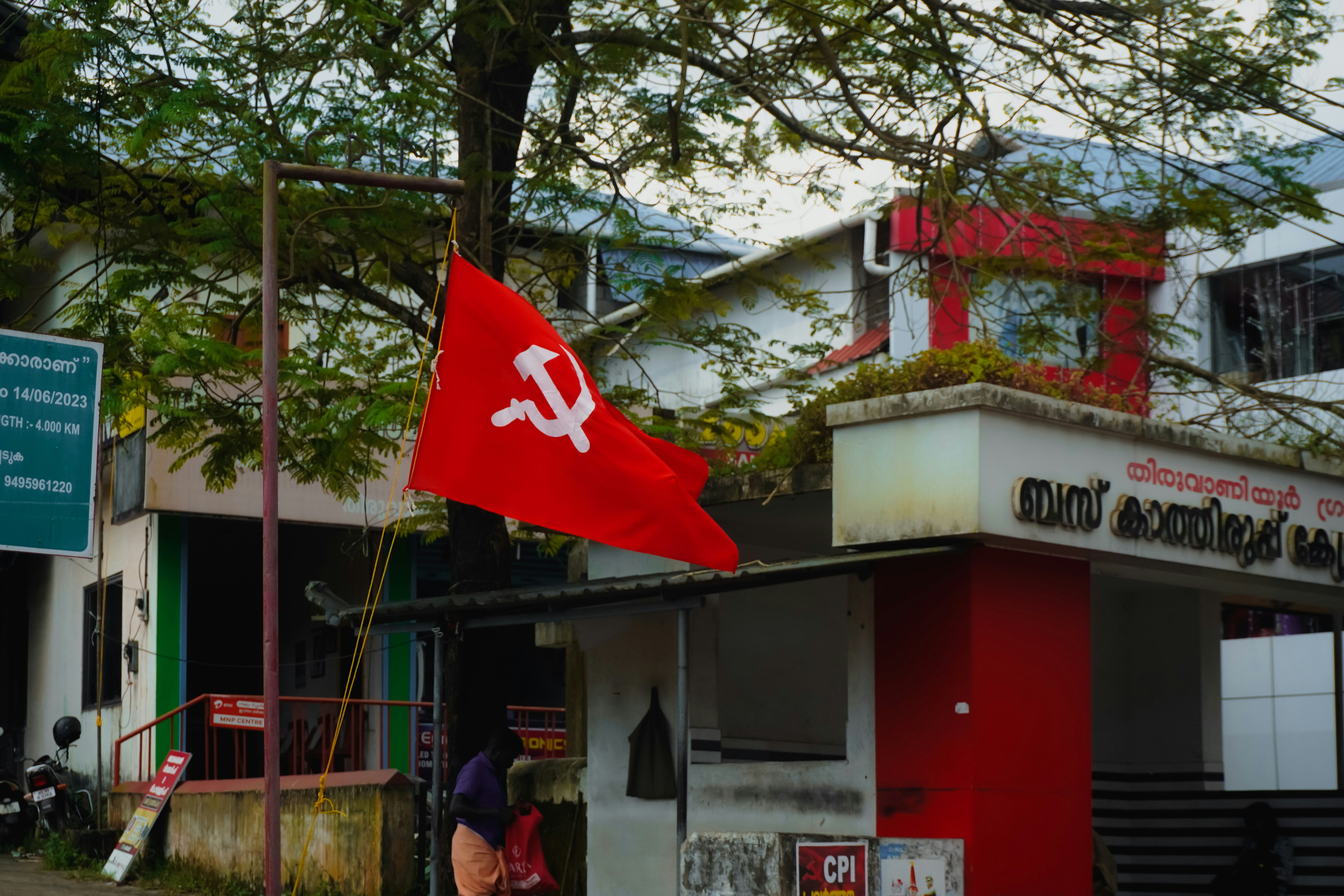 Emblem of Ideology: A Red Flag in the Urban Landscape