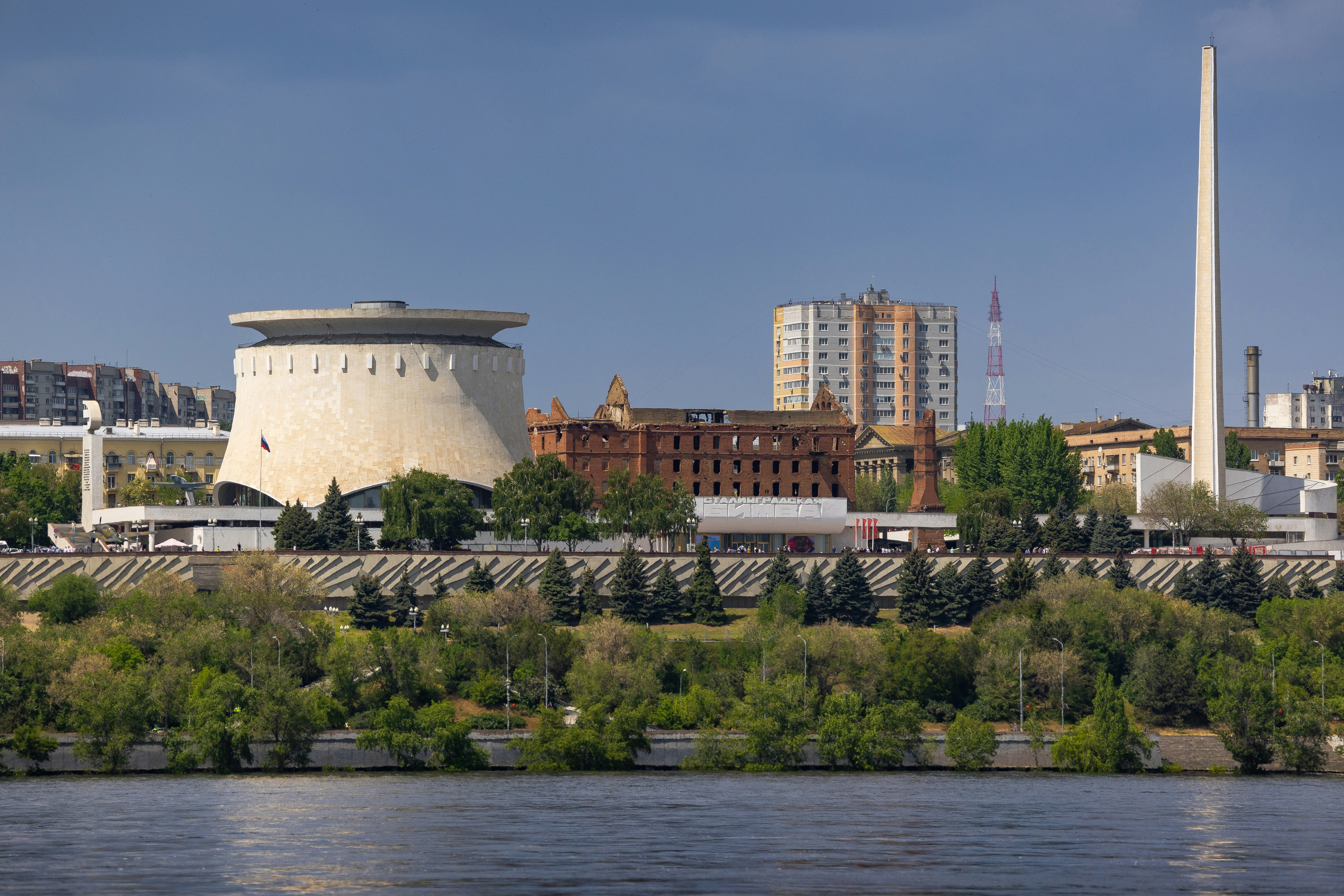 City skyline with modern and old buildings by river