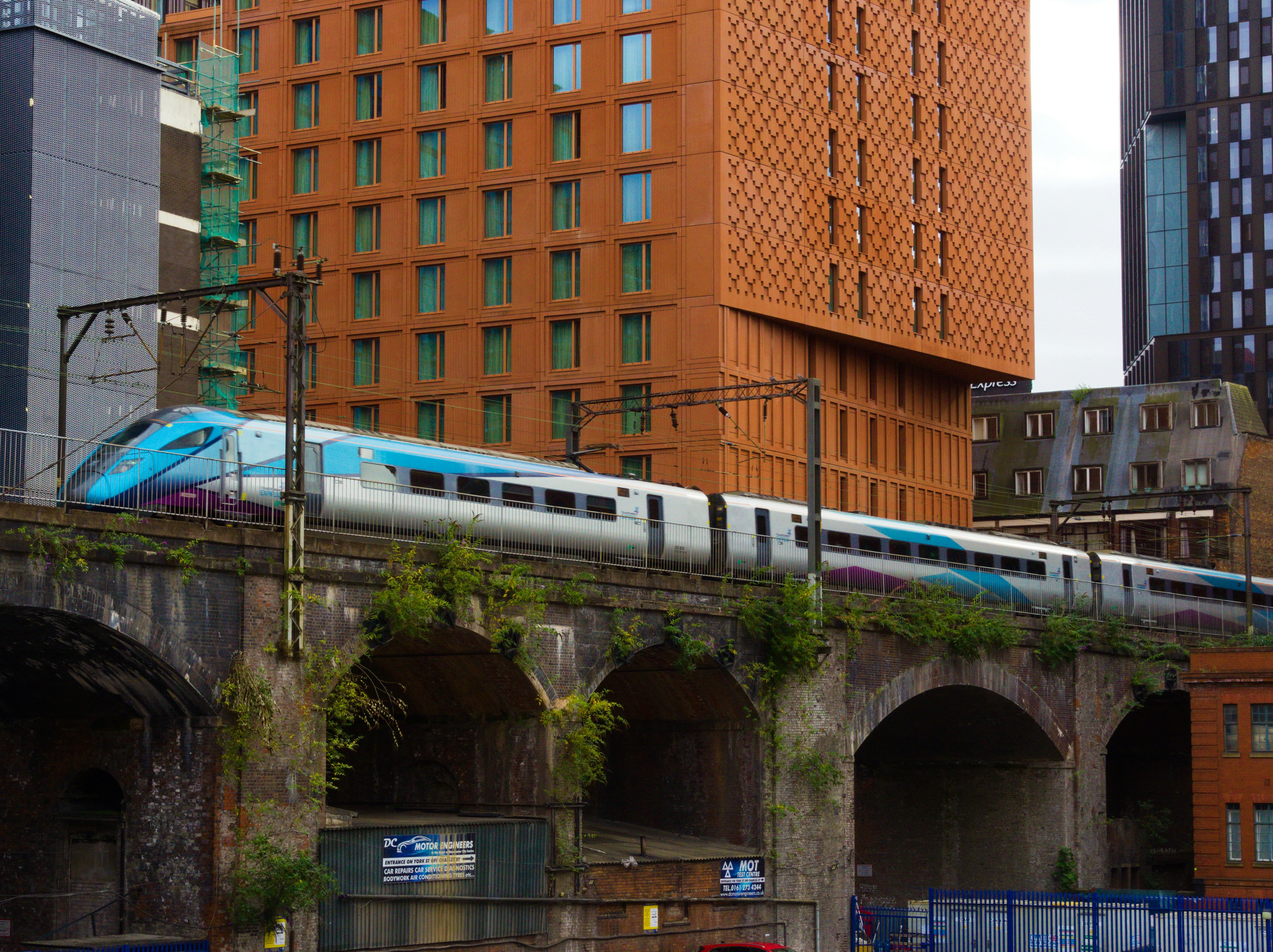 Urban Transit: A Train's Journey Through Modern Architecture