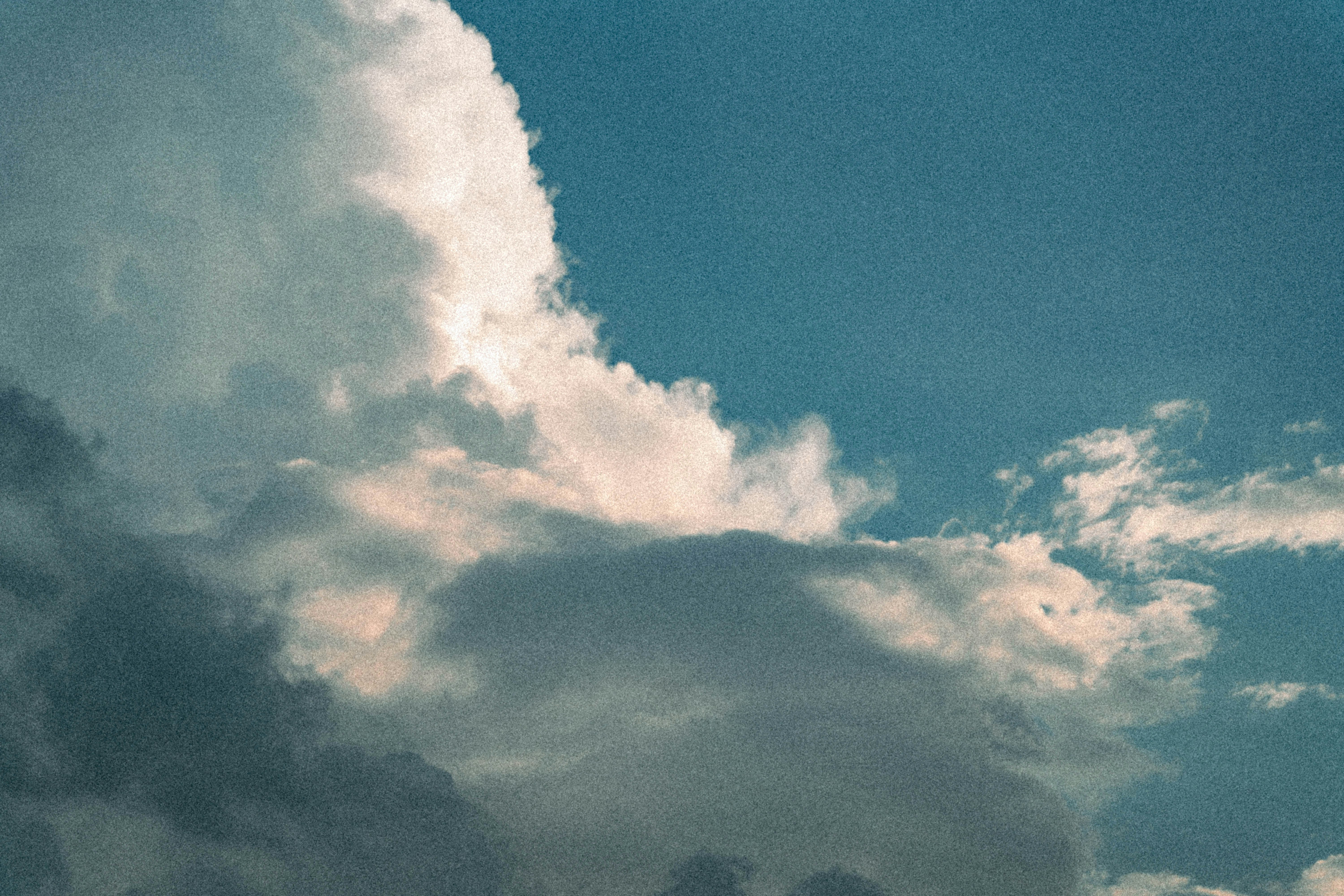 Smells like a Dream | Dramatic clouds against a bright blue sky