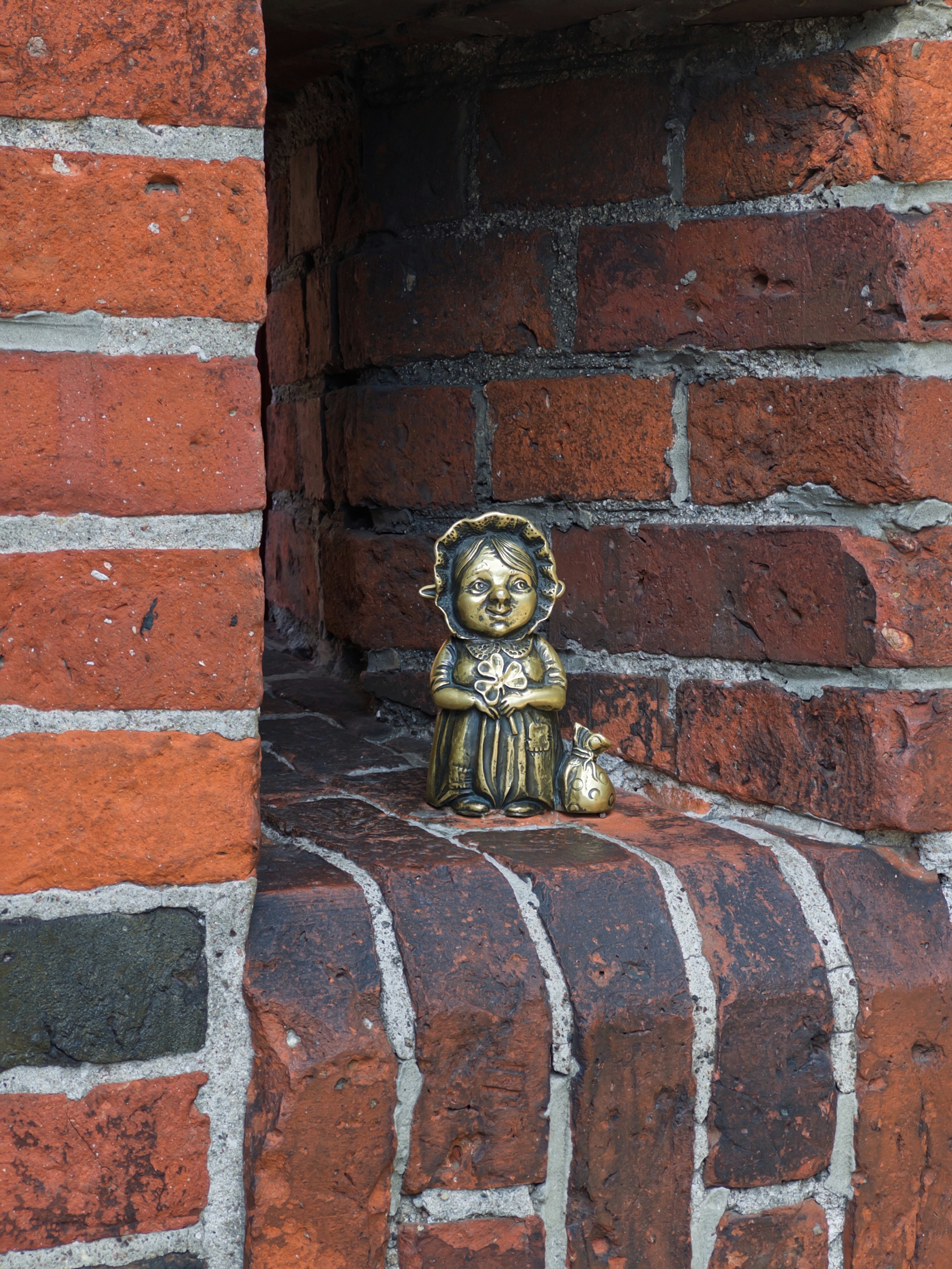 Whimsical Guardian of the Brick Nook