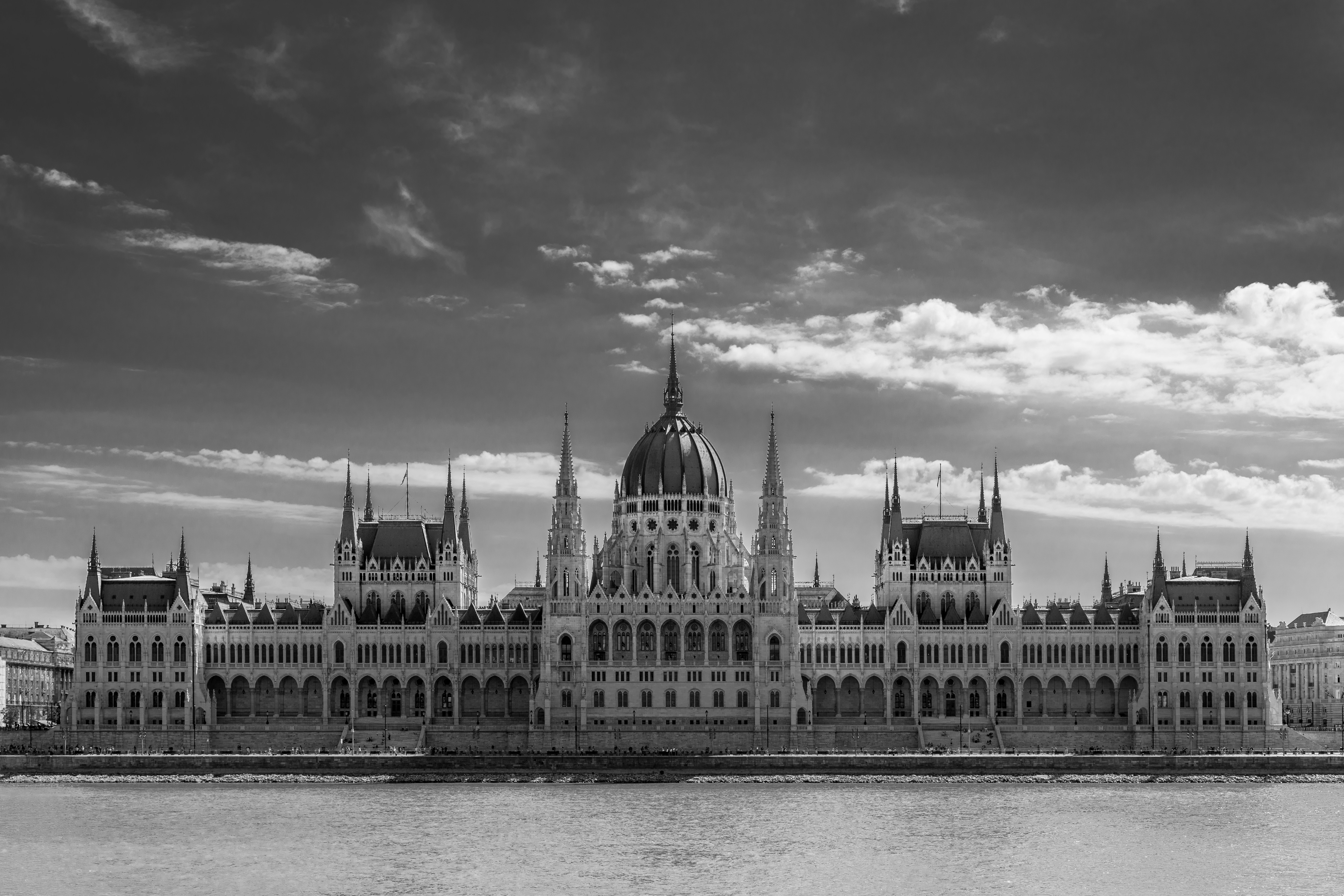 Grand building facade with ornate details and dome