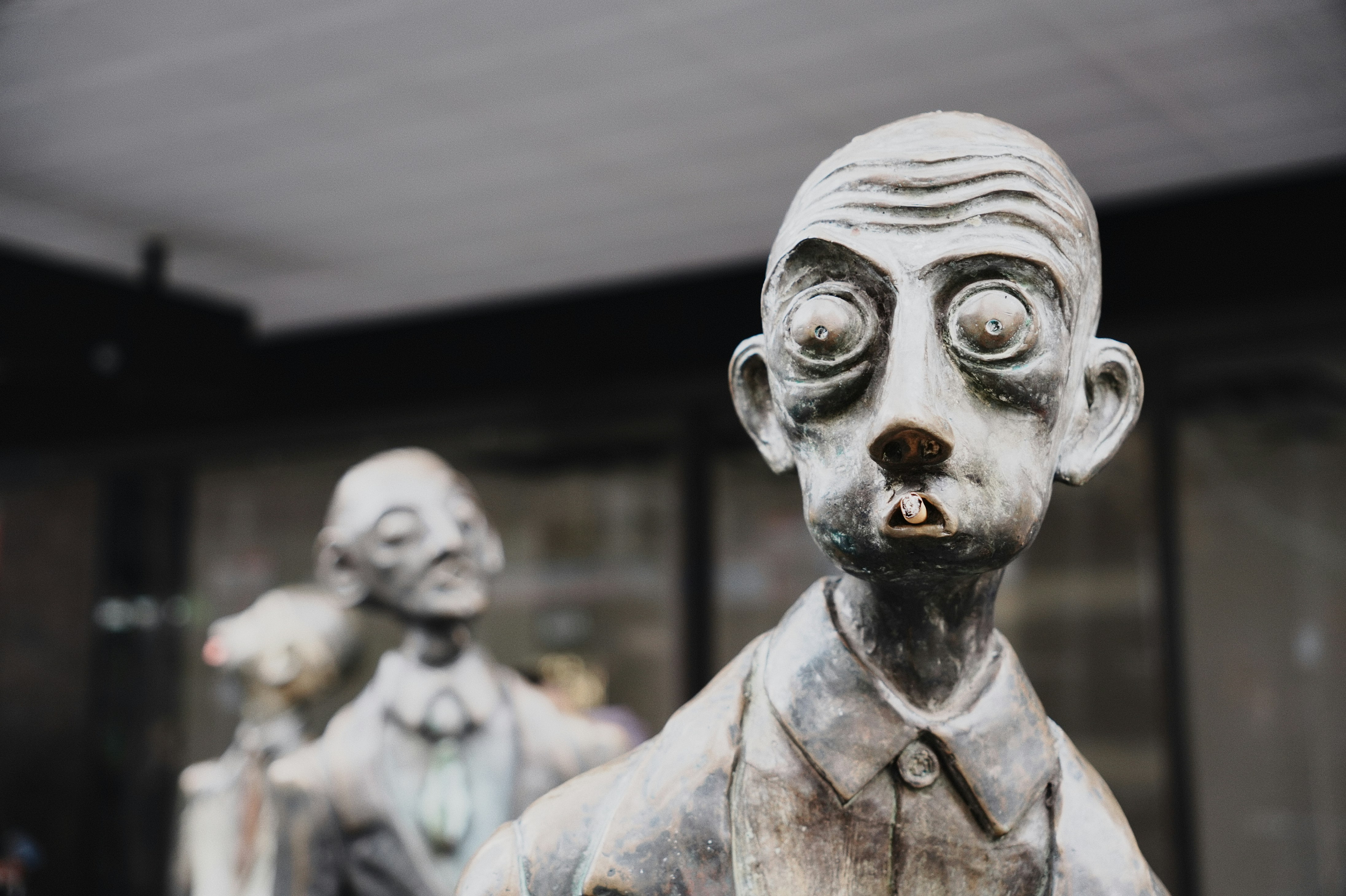 The Eerie Gaze of Urban Sculptures