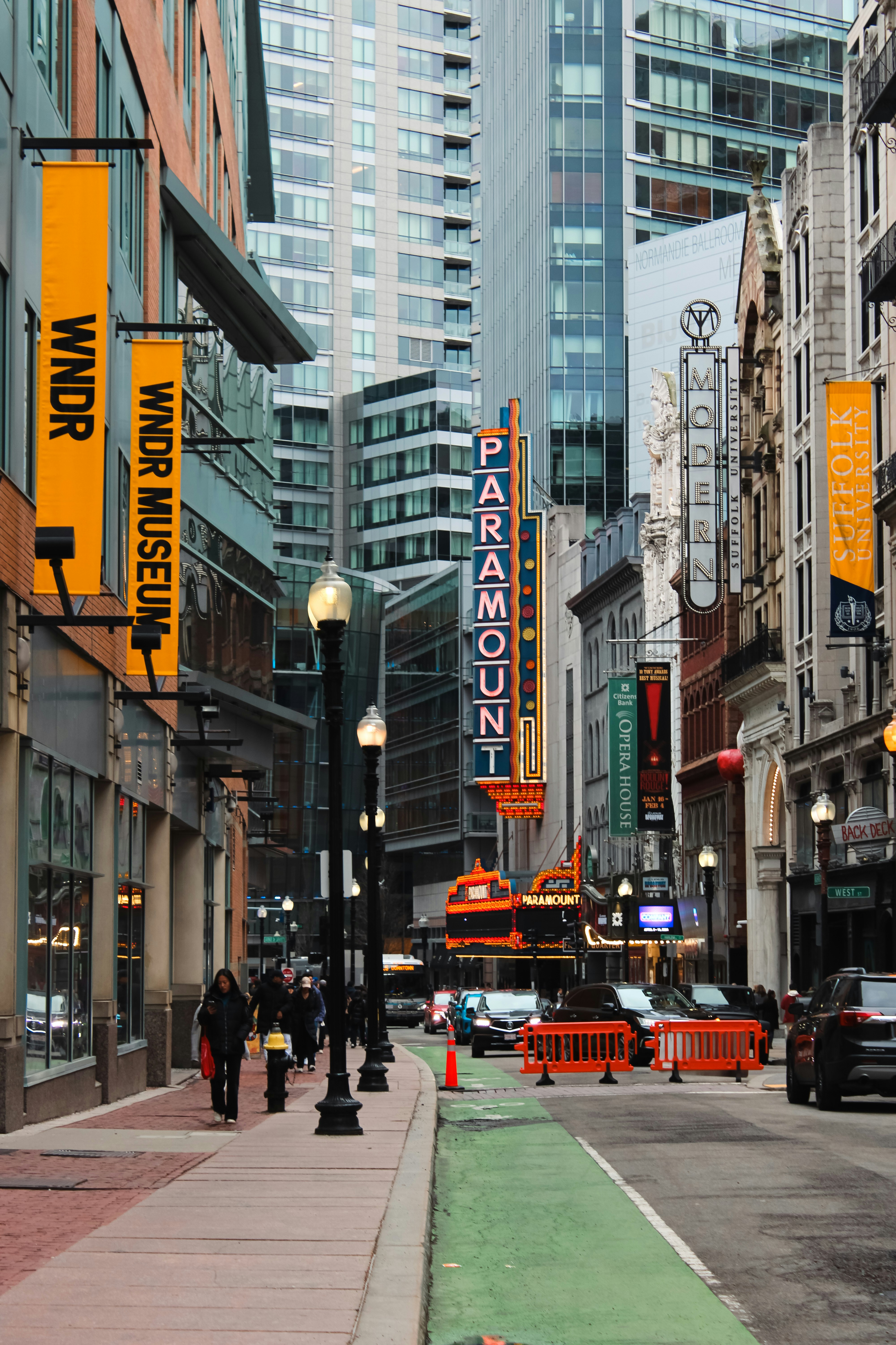 Downtown Boston Washington Street with Paramount Theatre | Paramount sign on a city street with pedestrians