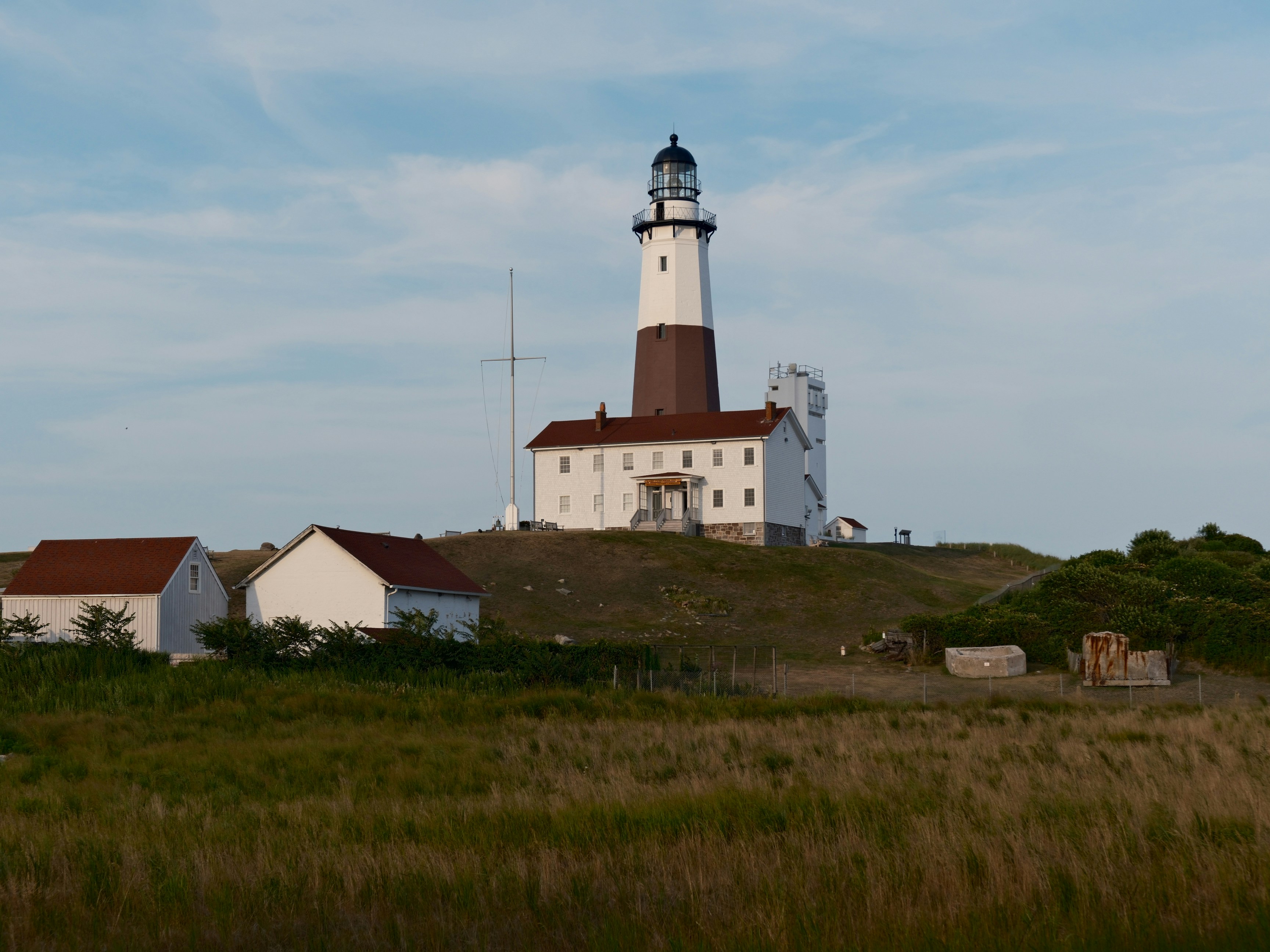Beacon of Tranquility: The Lighthouse at Dusk