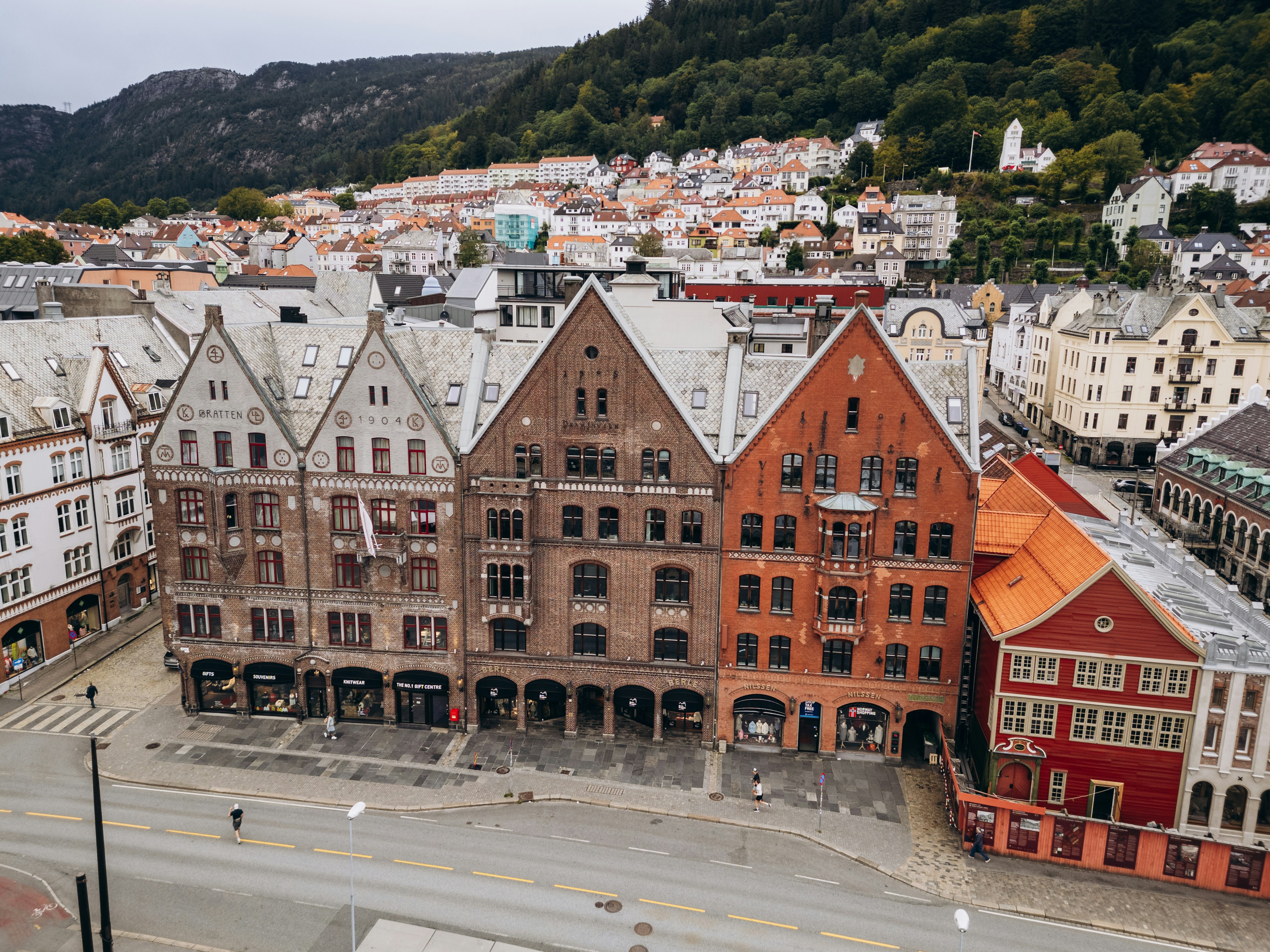 Gabled Brick Townhouses Framing a Hillside Street
