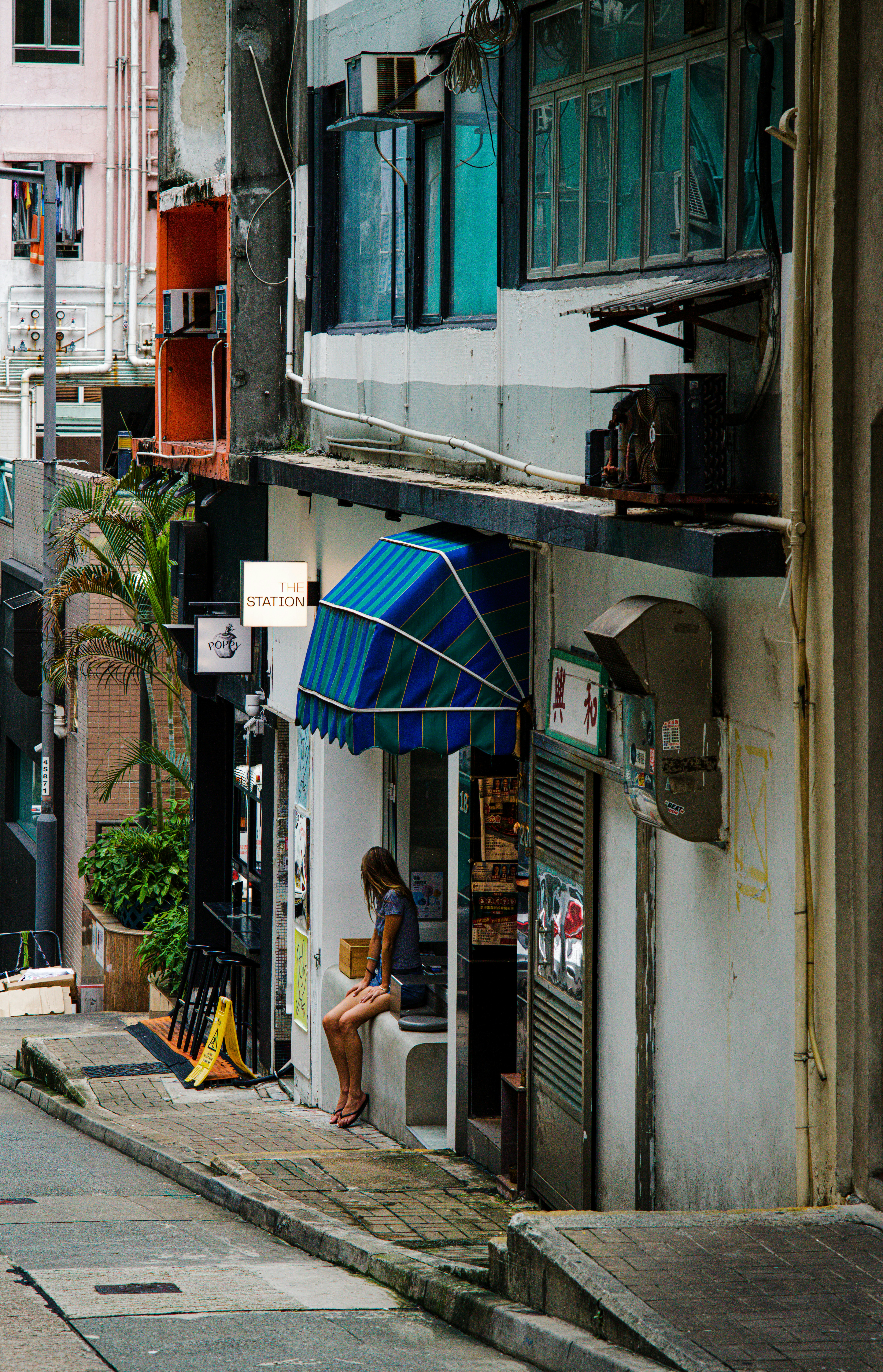 Urban Solitude: A Moment in the Alley