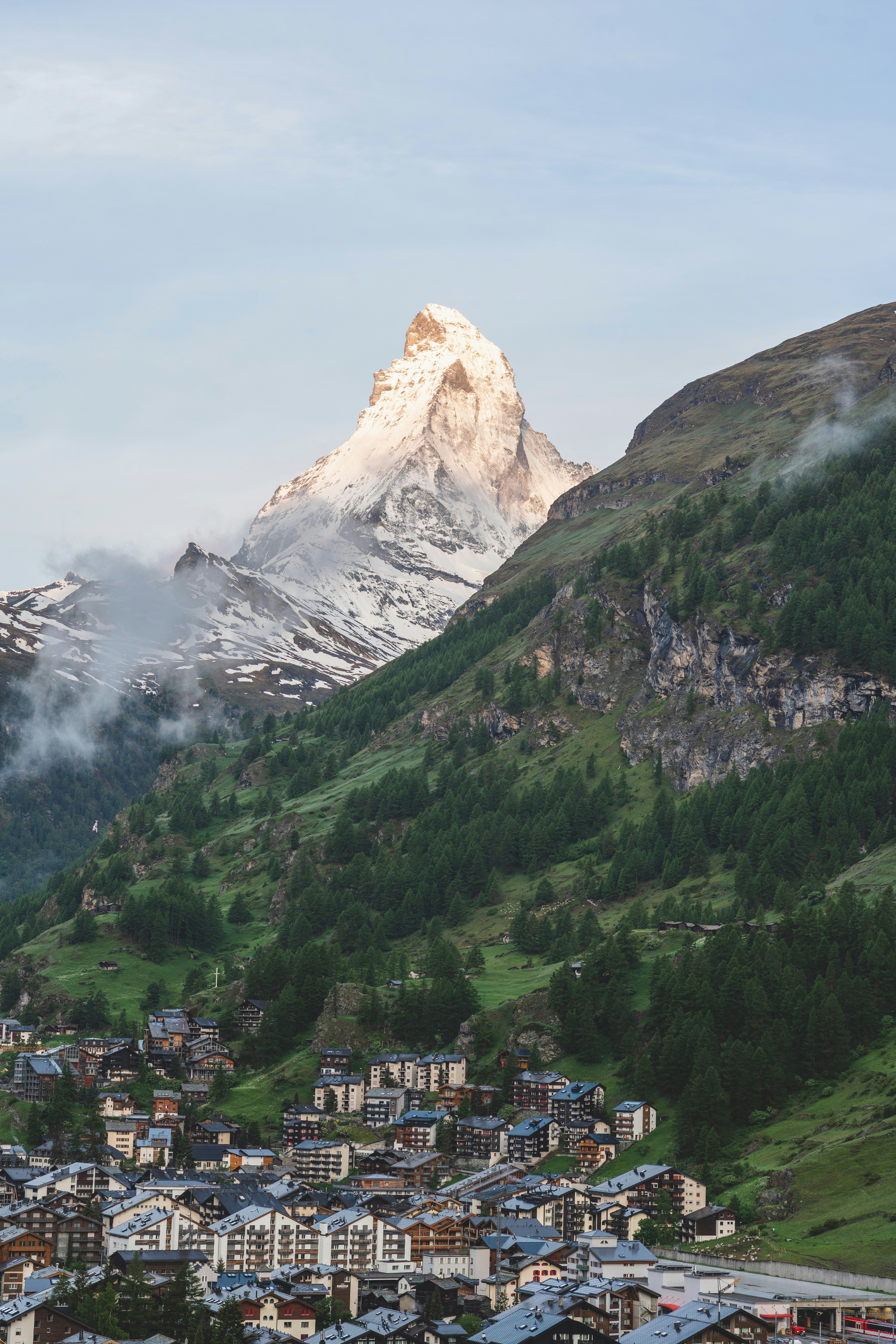 Golden Matterhorn | Snow-capped mountain peak above a village