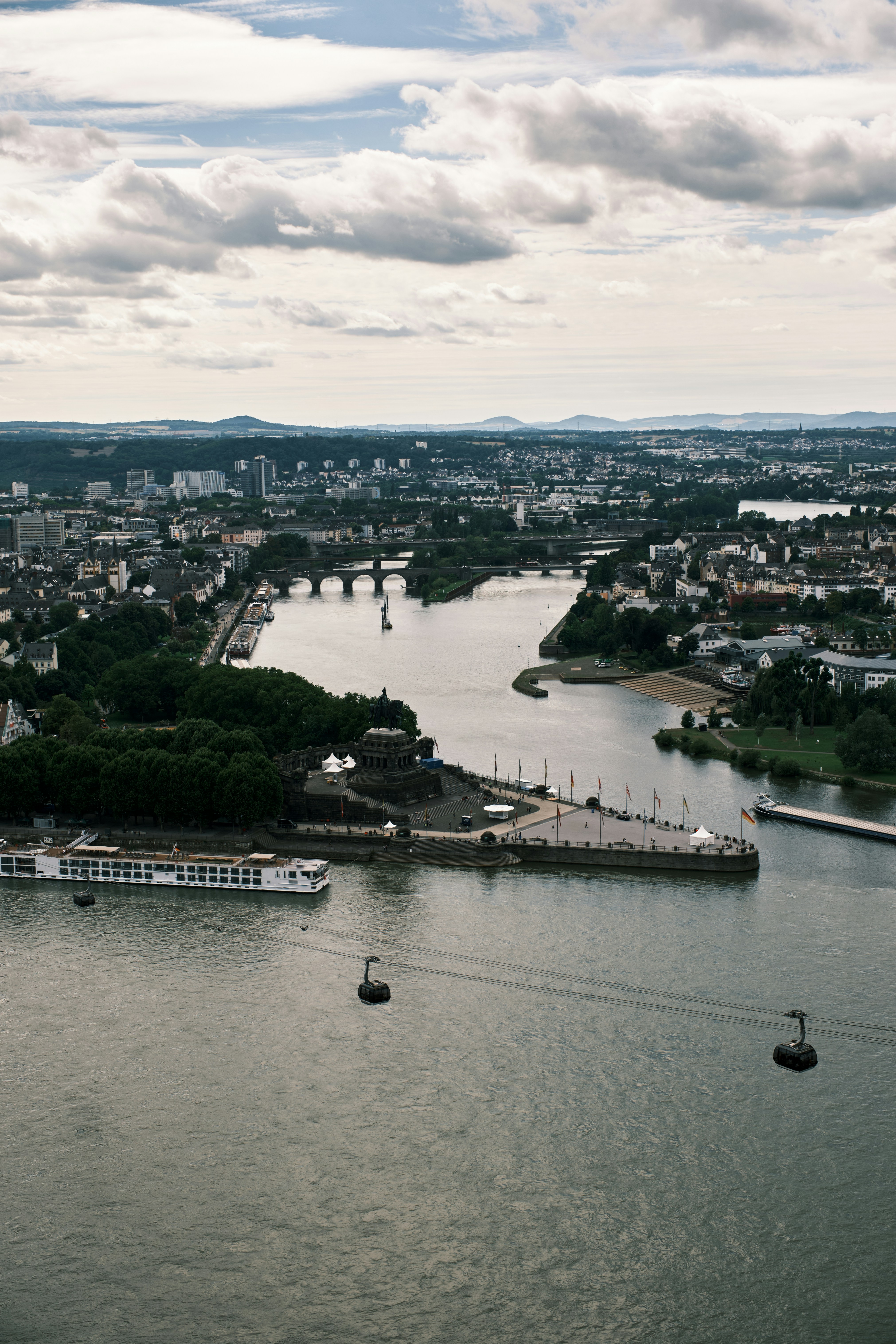 Aerial view of a city with a river and bridges