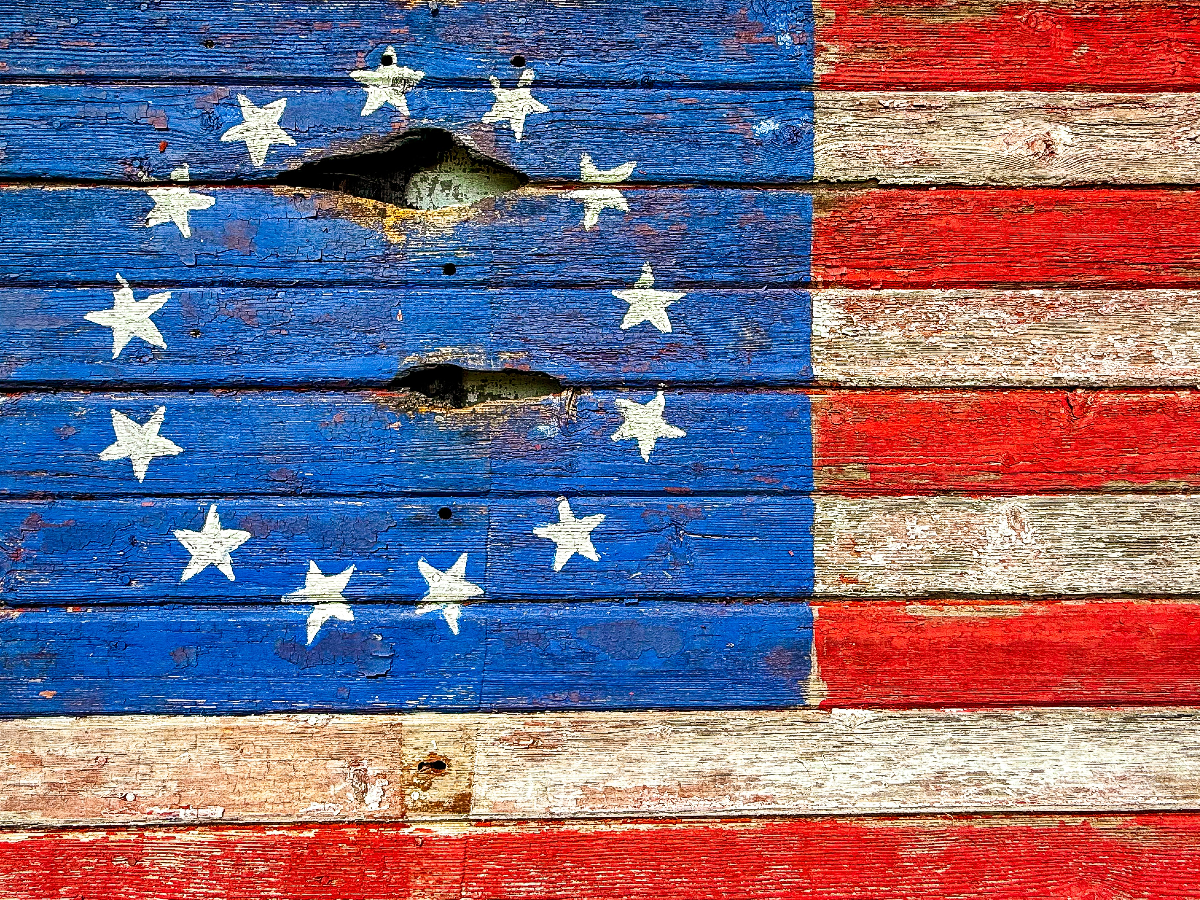 A distressed betsy ross flag with bullet holes. photo – Free American ...