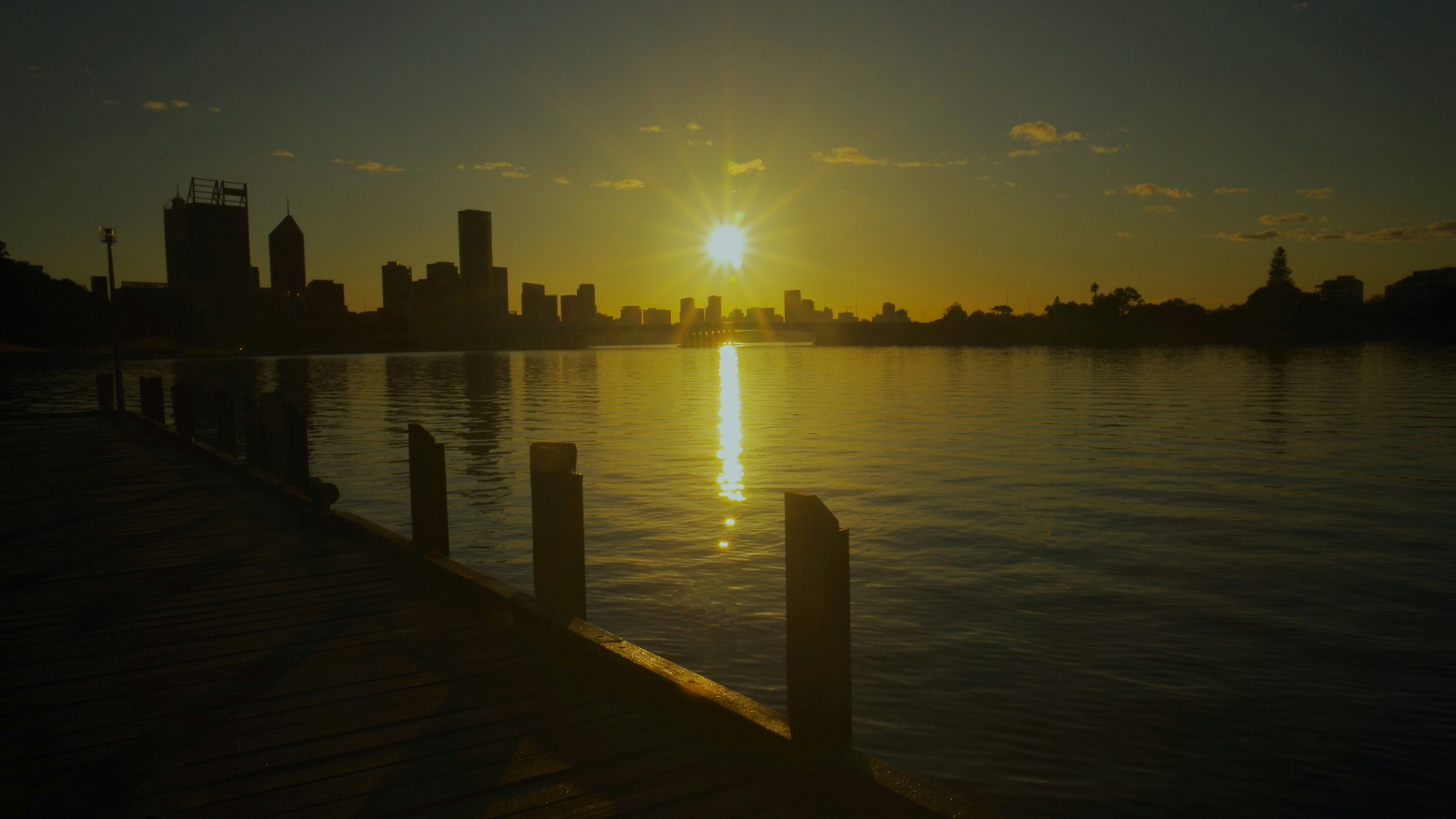 Sunset Reflections Over the Urban Horizon