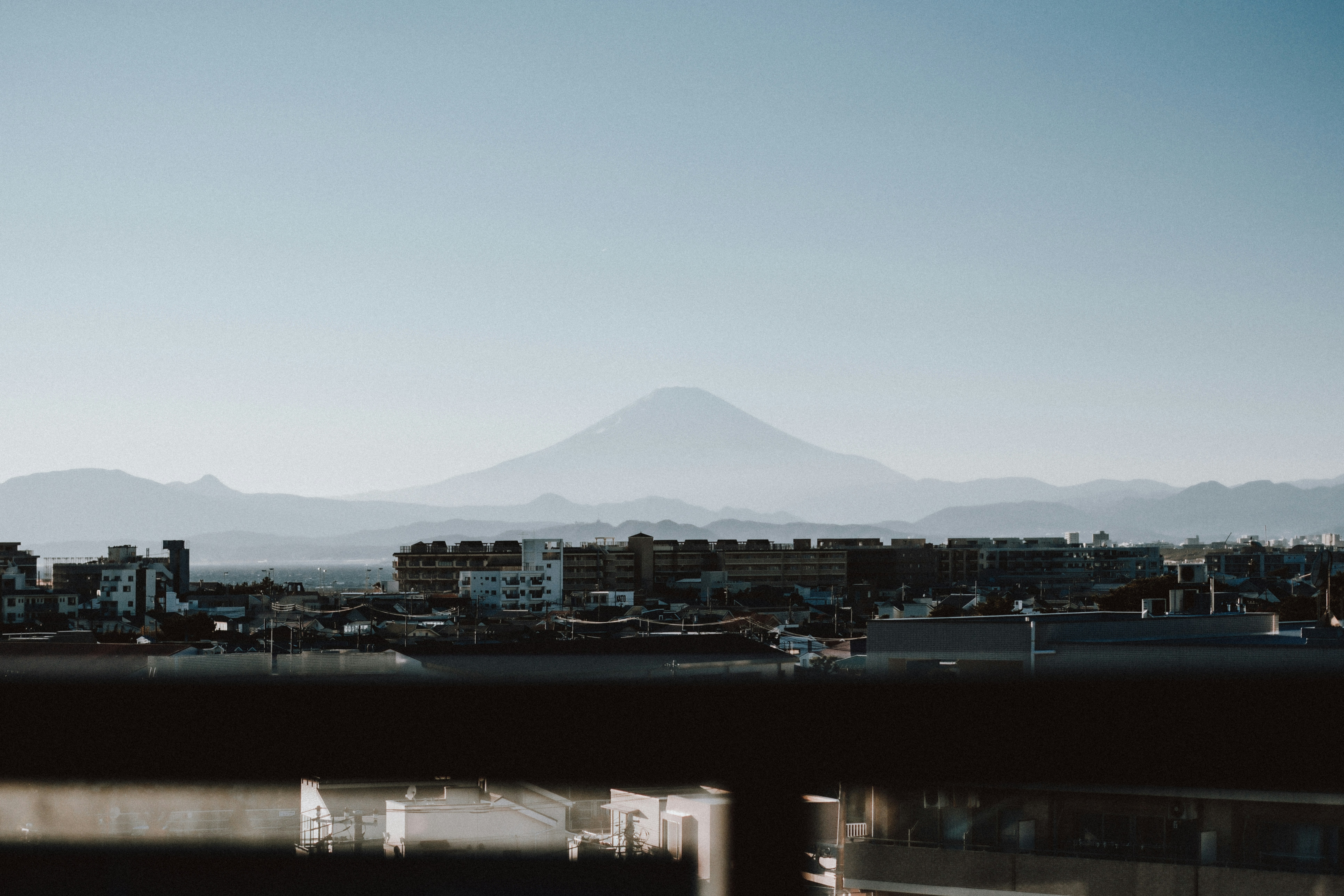 Veiled Majesty: A Serene Glimpse of Fuji
