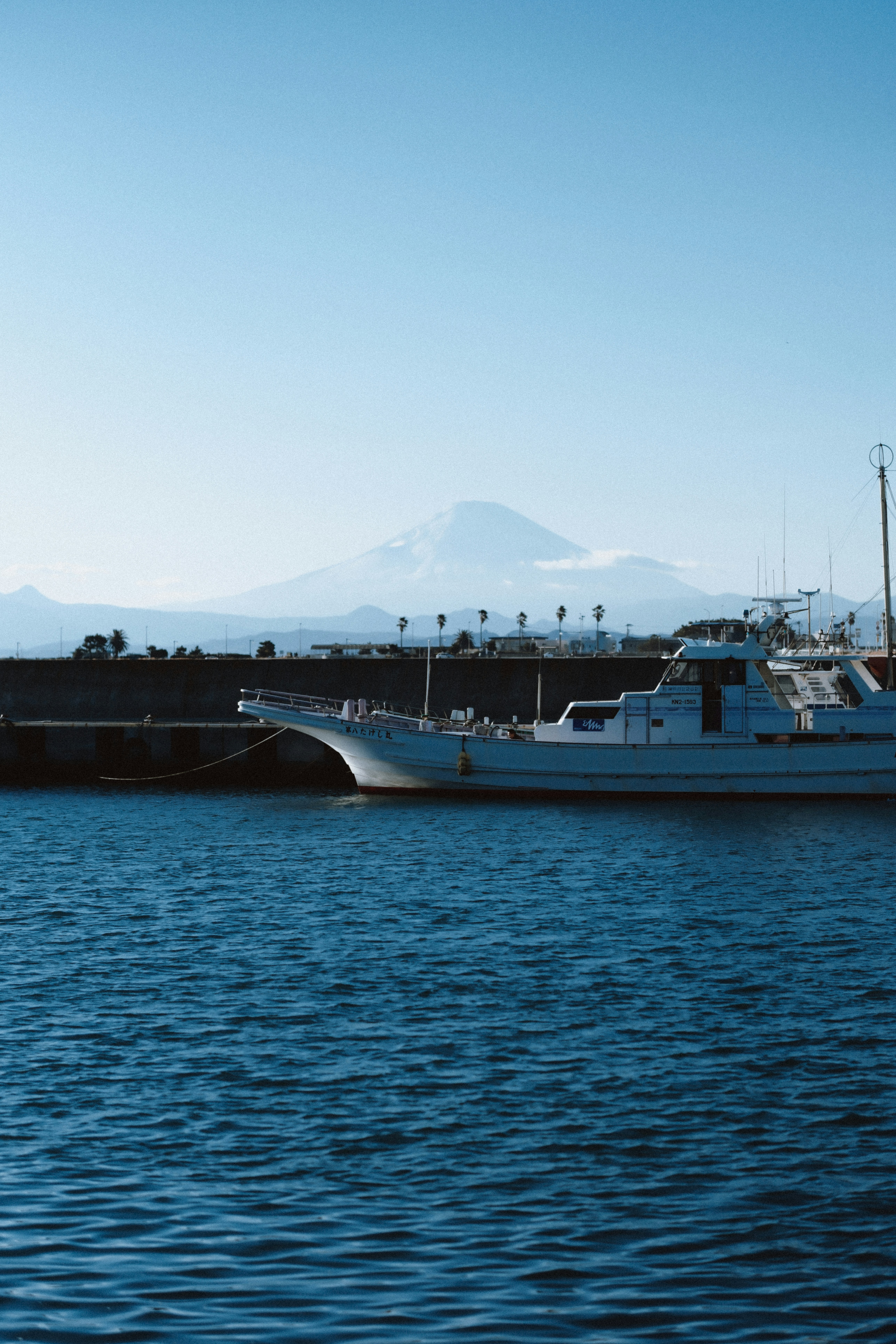 Harbor Quiet with Snow-Capped Summit in the Distance