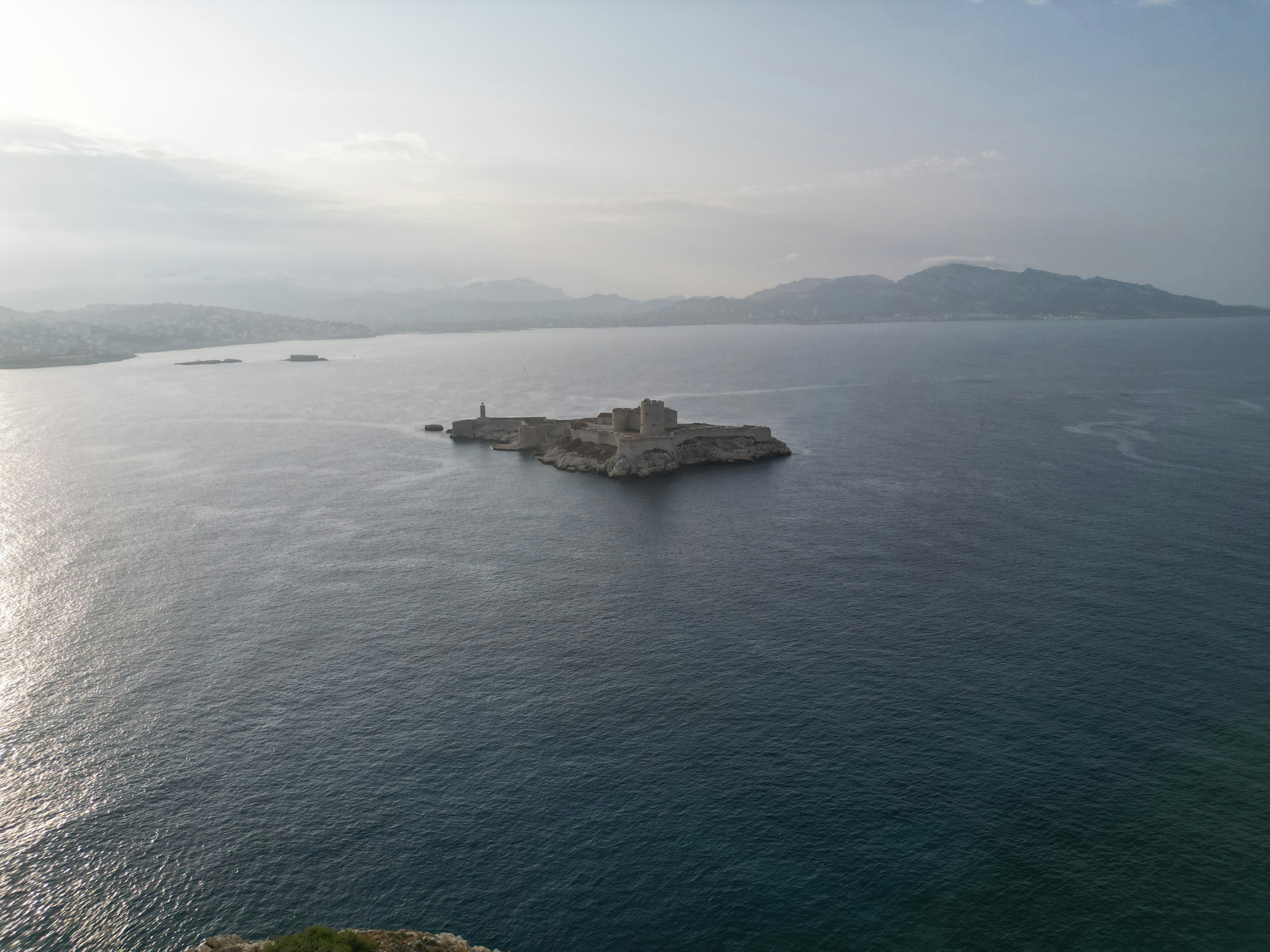 Fortress on an island in the calm blue sea