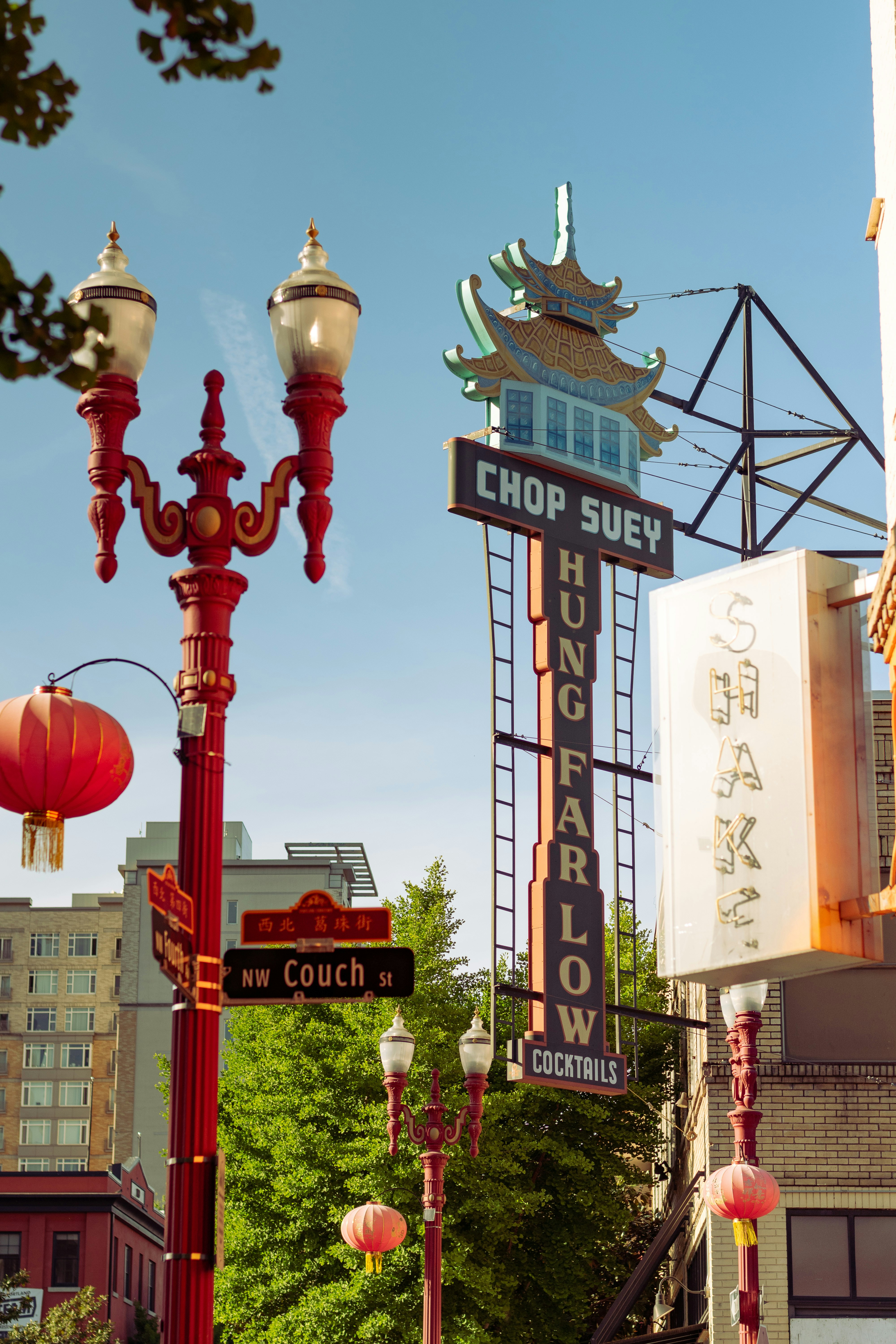 Chop Suey sign in Portland | Chinatown street with ornate lampposts and signs.