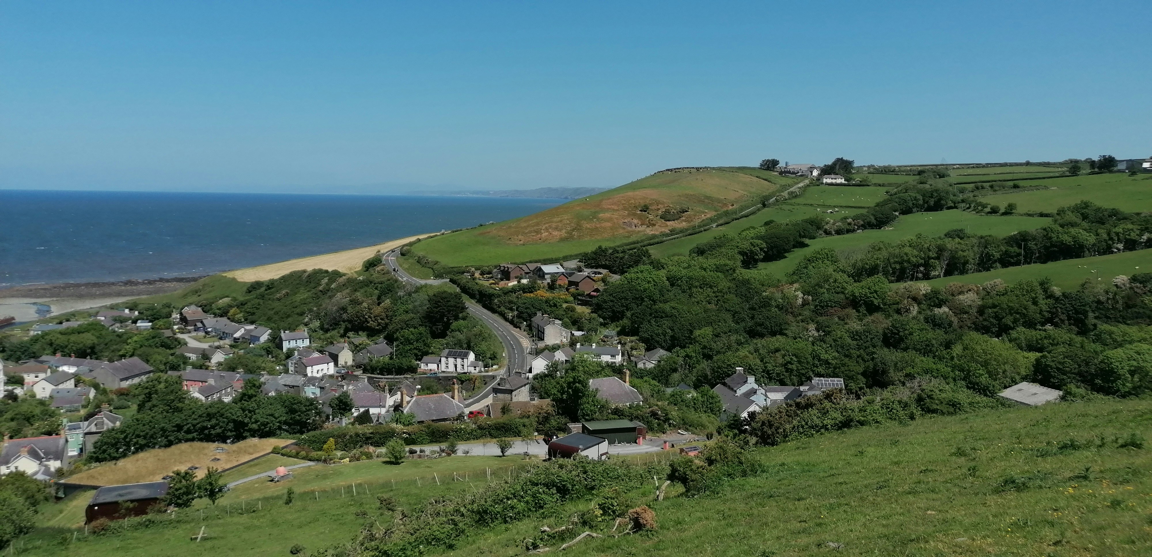 Coastal Serenity: A Village Embraced by Nature
