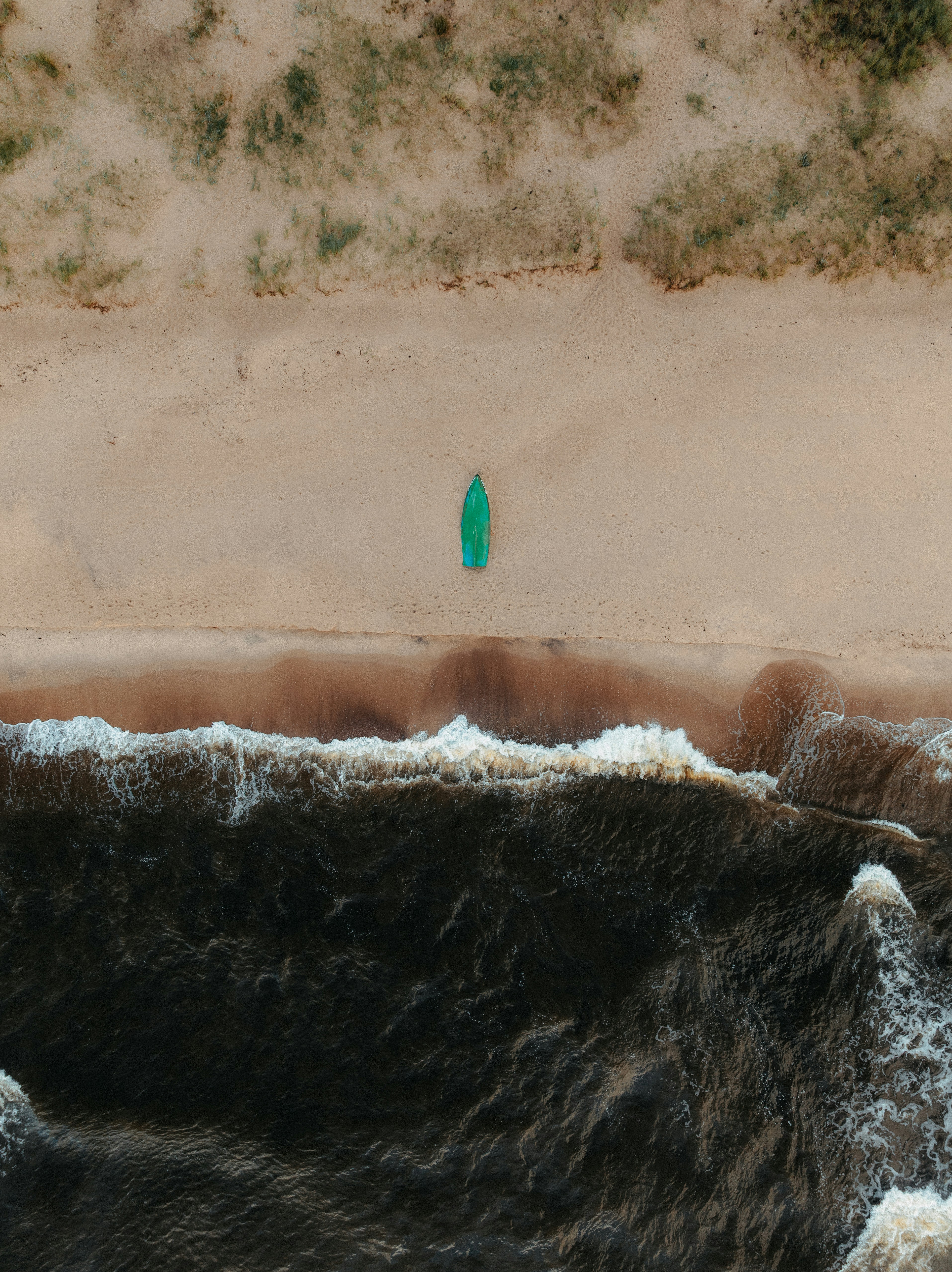 Solitude on the Shoreline: A Lone Kayak's Journey