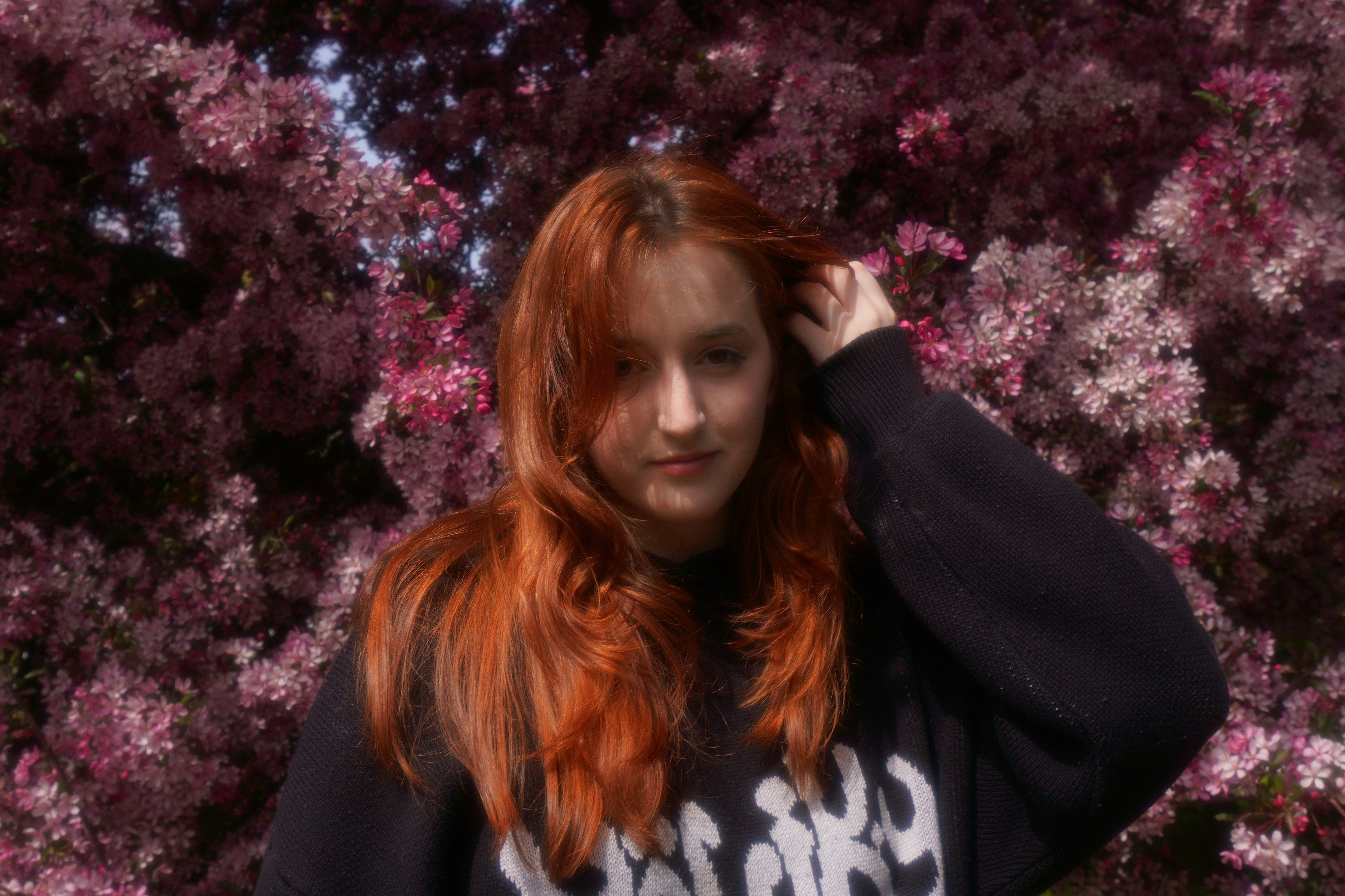 Whispers of Spring: A Portrait Amid Blossoms